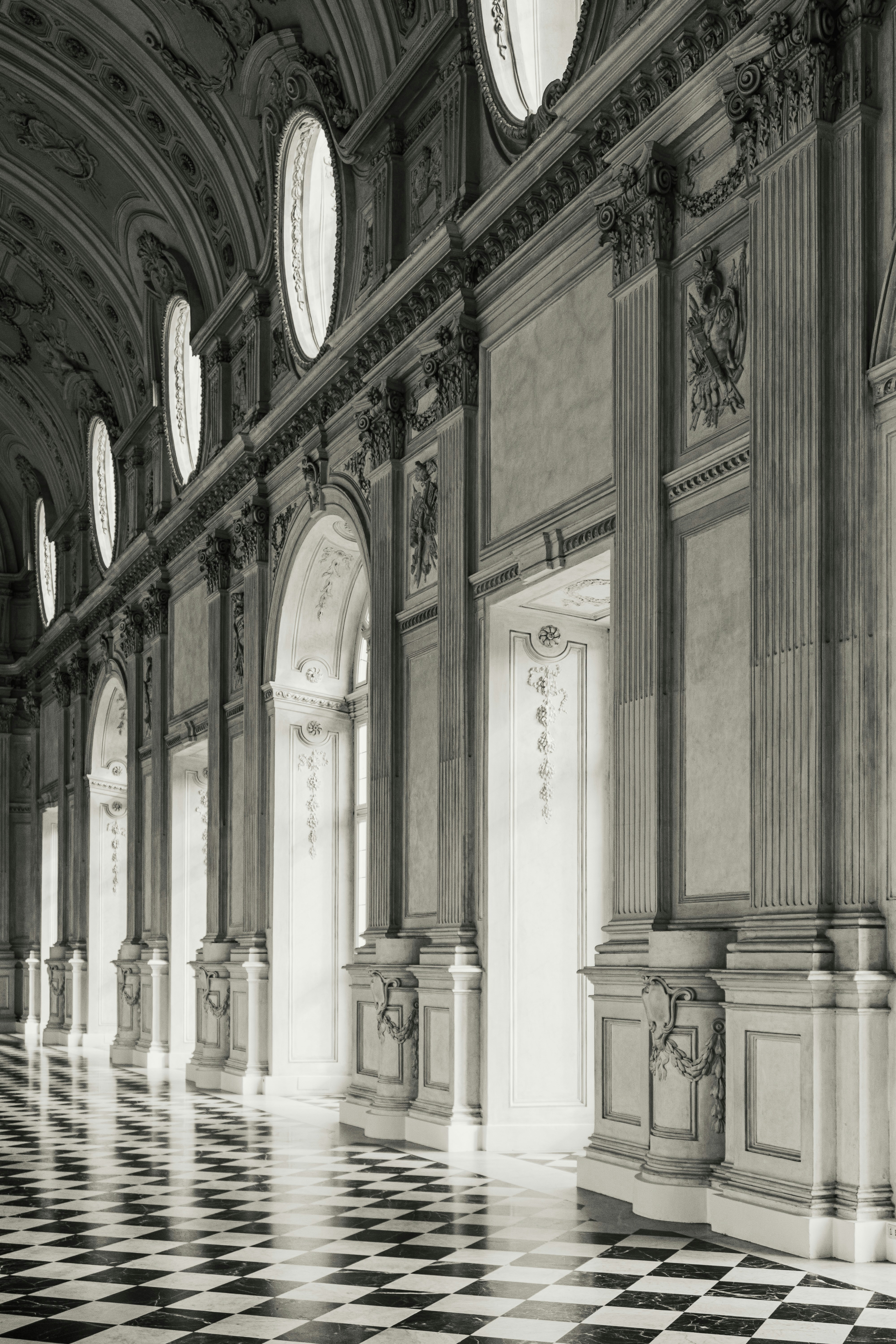 Hushed Grandeur of a Grand Hall: Symmetry and Light carved in Marble