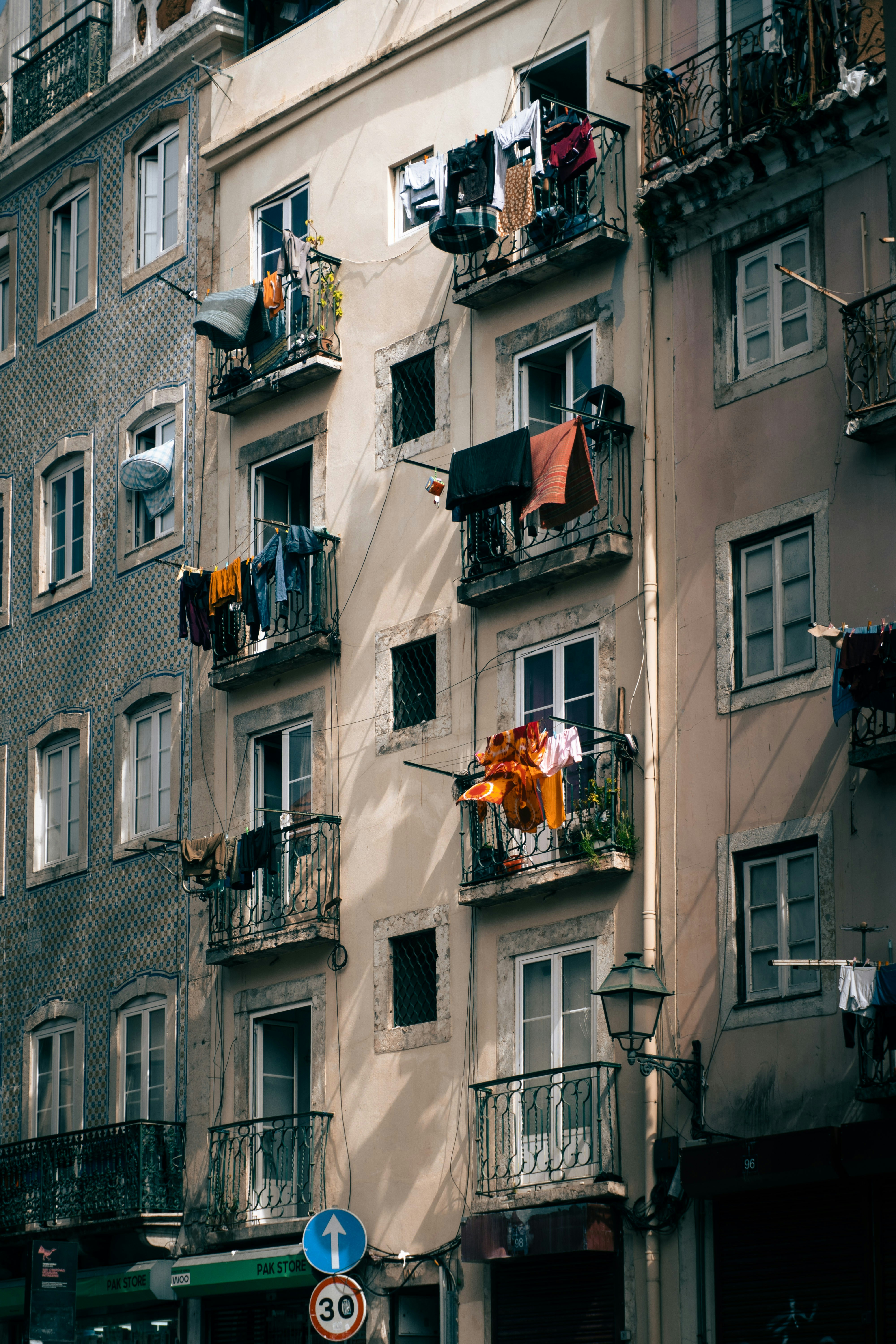 Laundry on the Line: A Patchwork of Balconies in the City Light