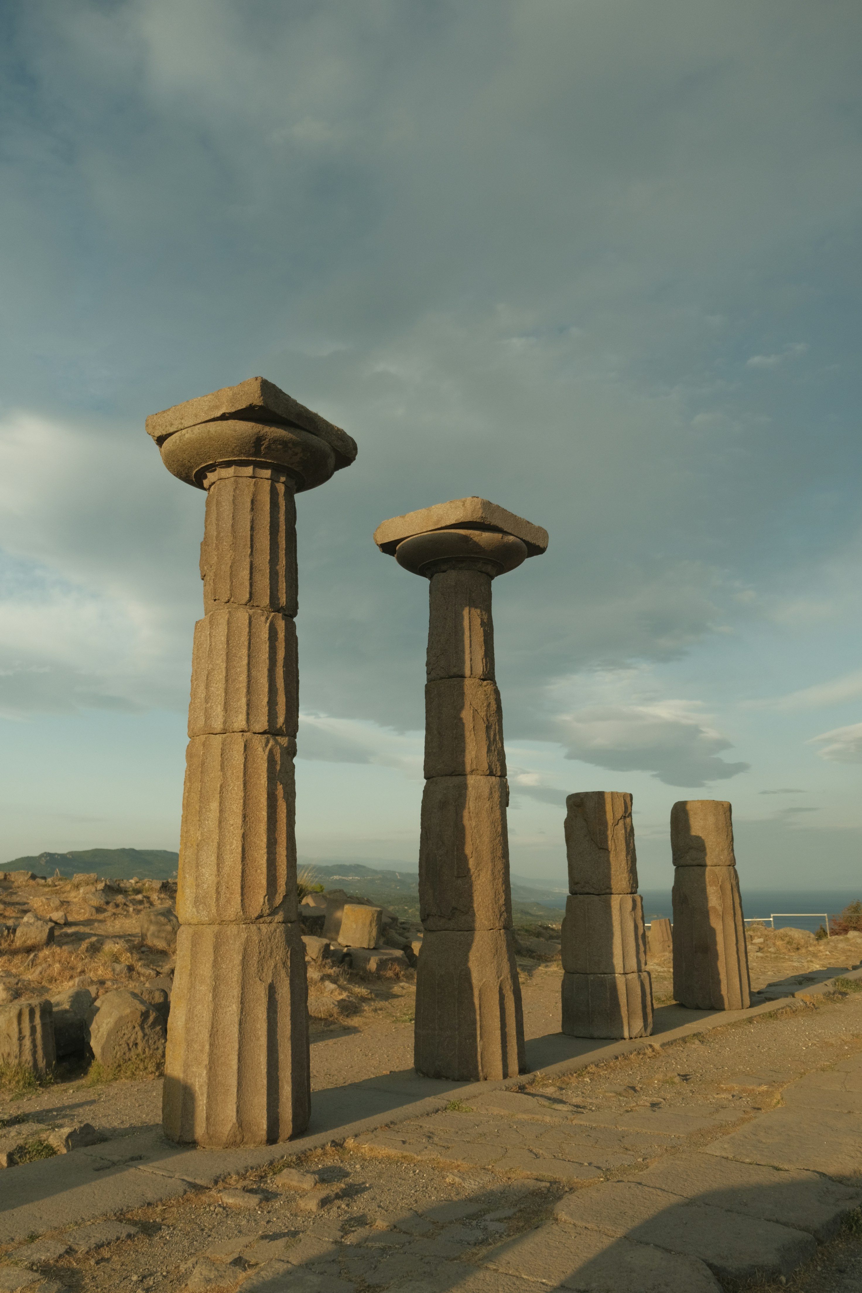 Ancient Columns on a Windlit Cliff