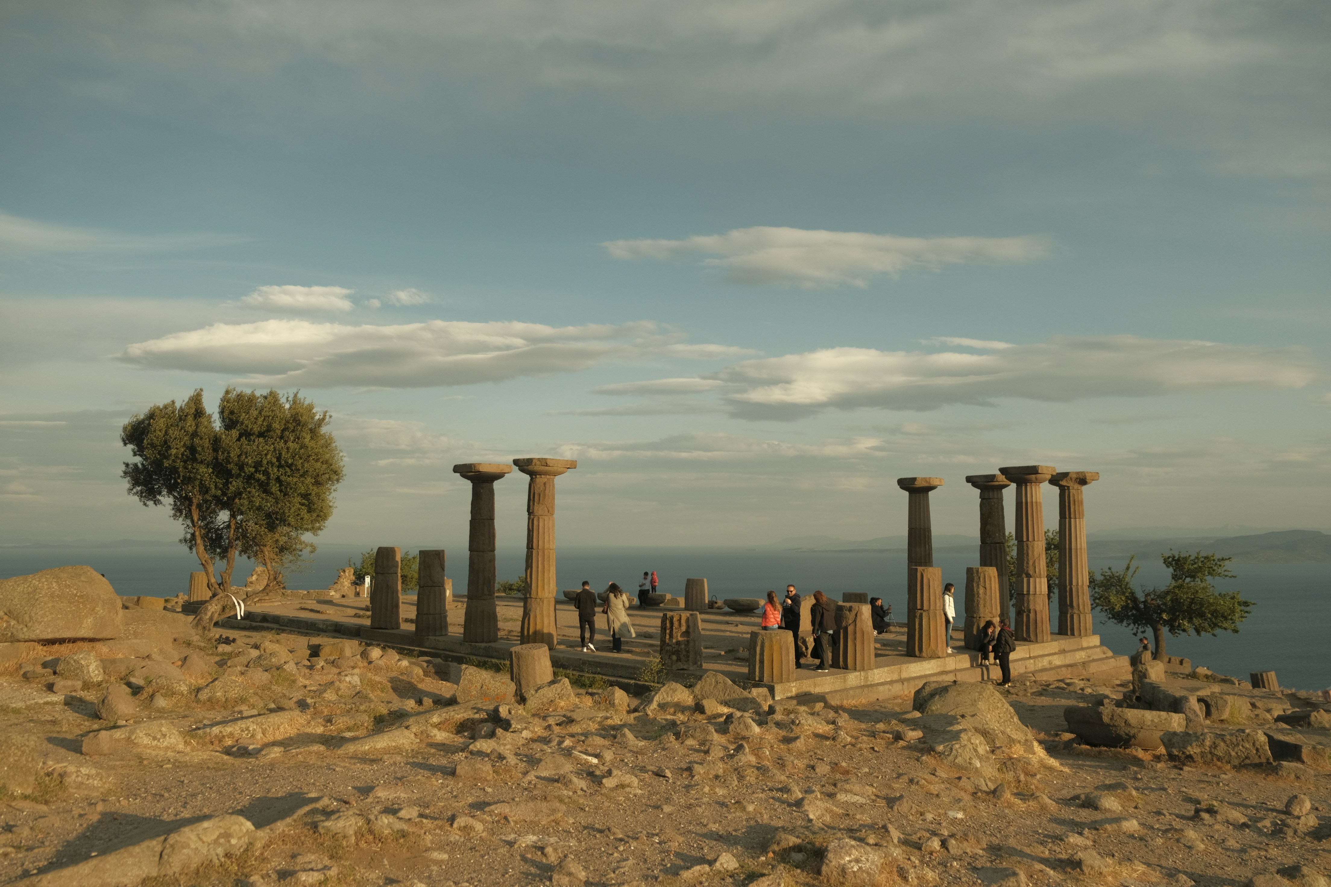 Old Temple on the Promontory: Tourists at the Sea-Battered Ruins