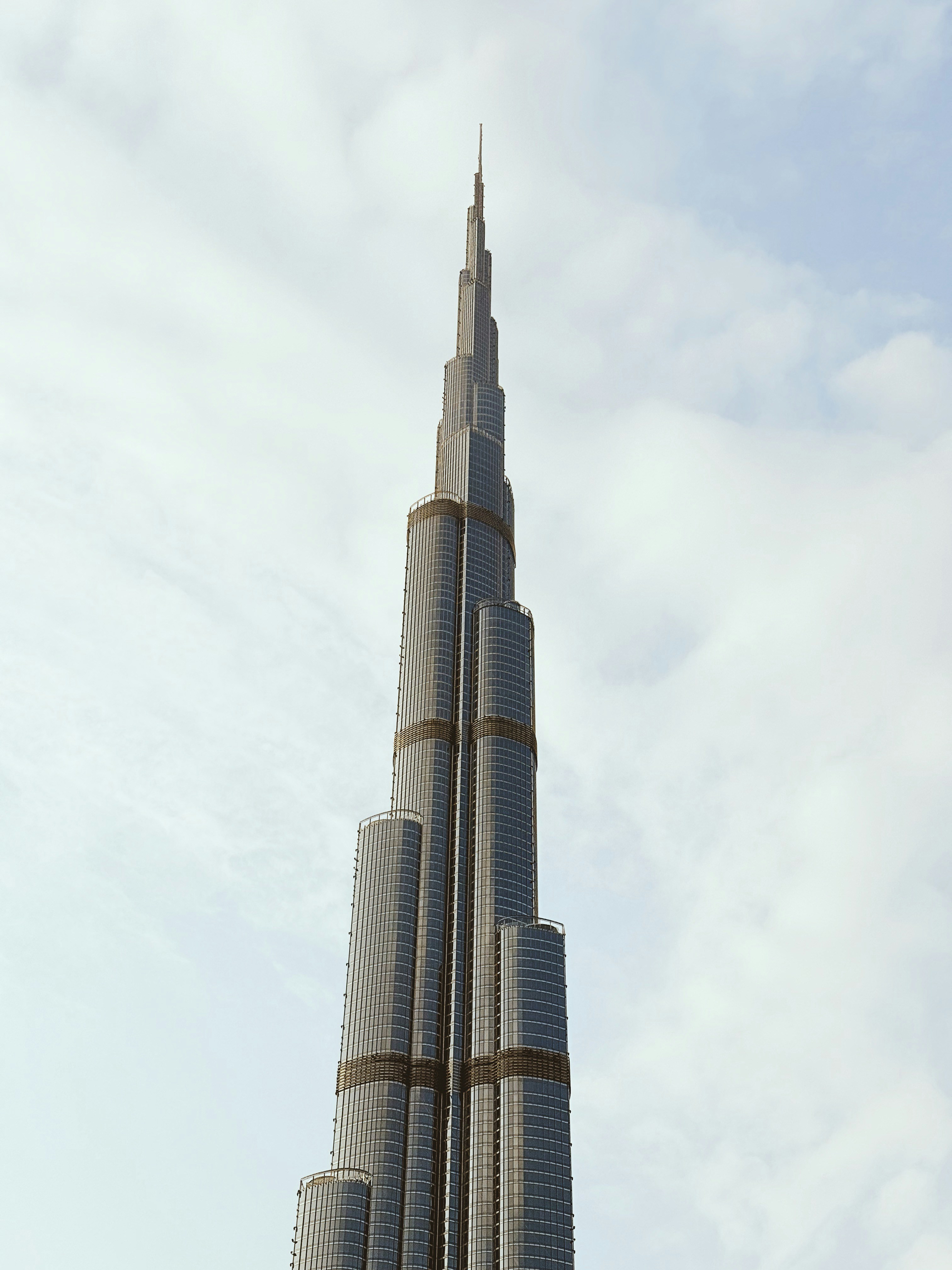 Spire of Sky: Burj Khalifa Piercing a Bright Dubai Sky
