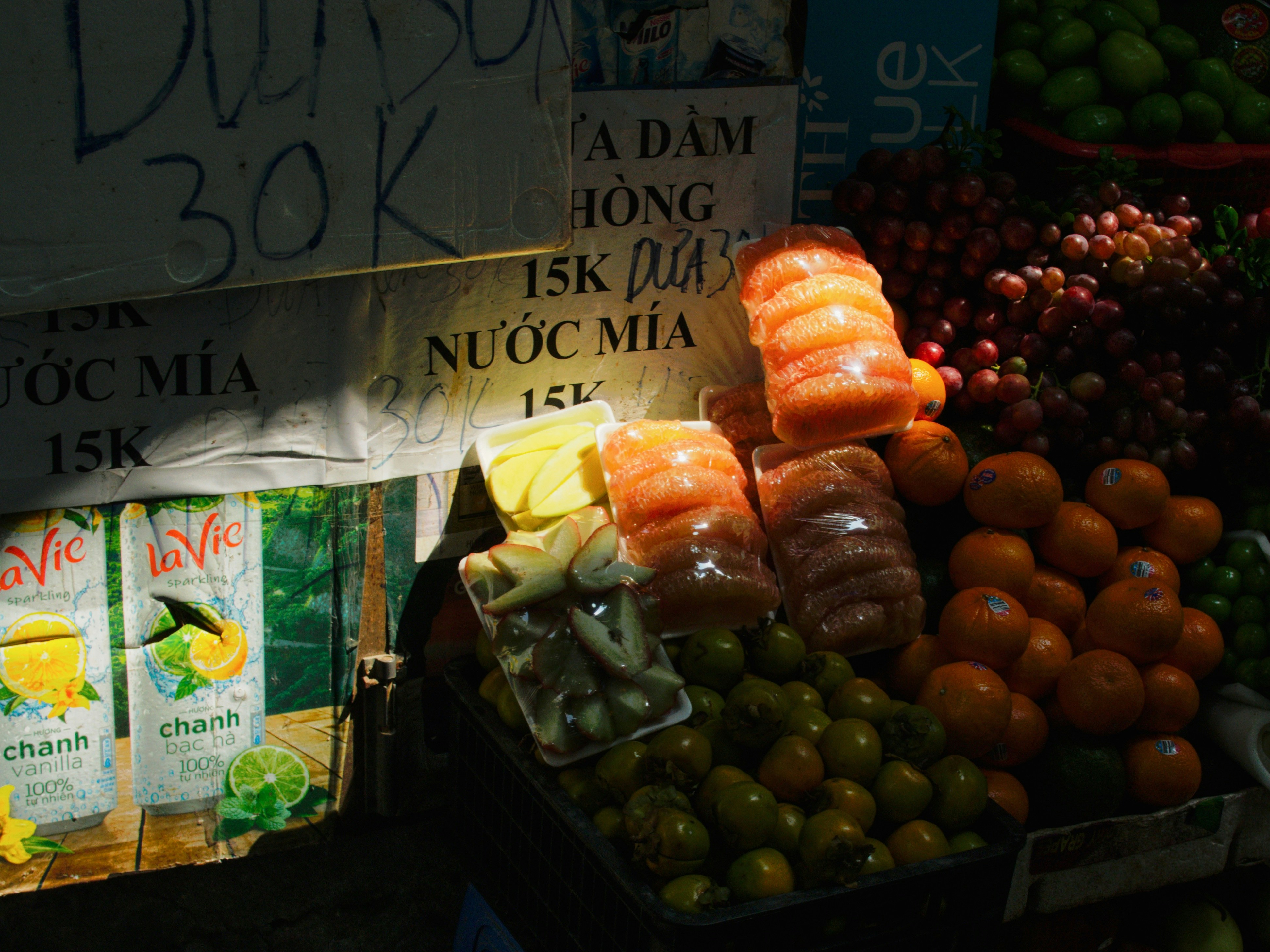 Fruit Stand Glow: Craftsmanship of Color Under Market Neon