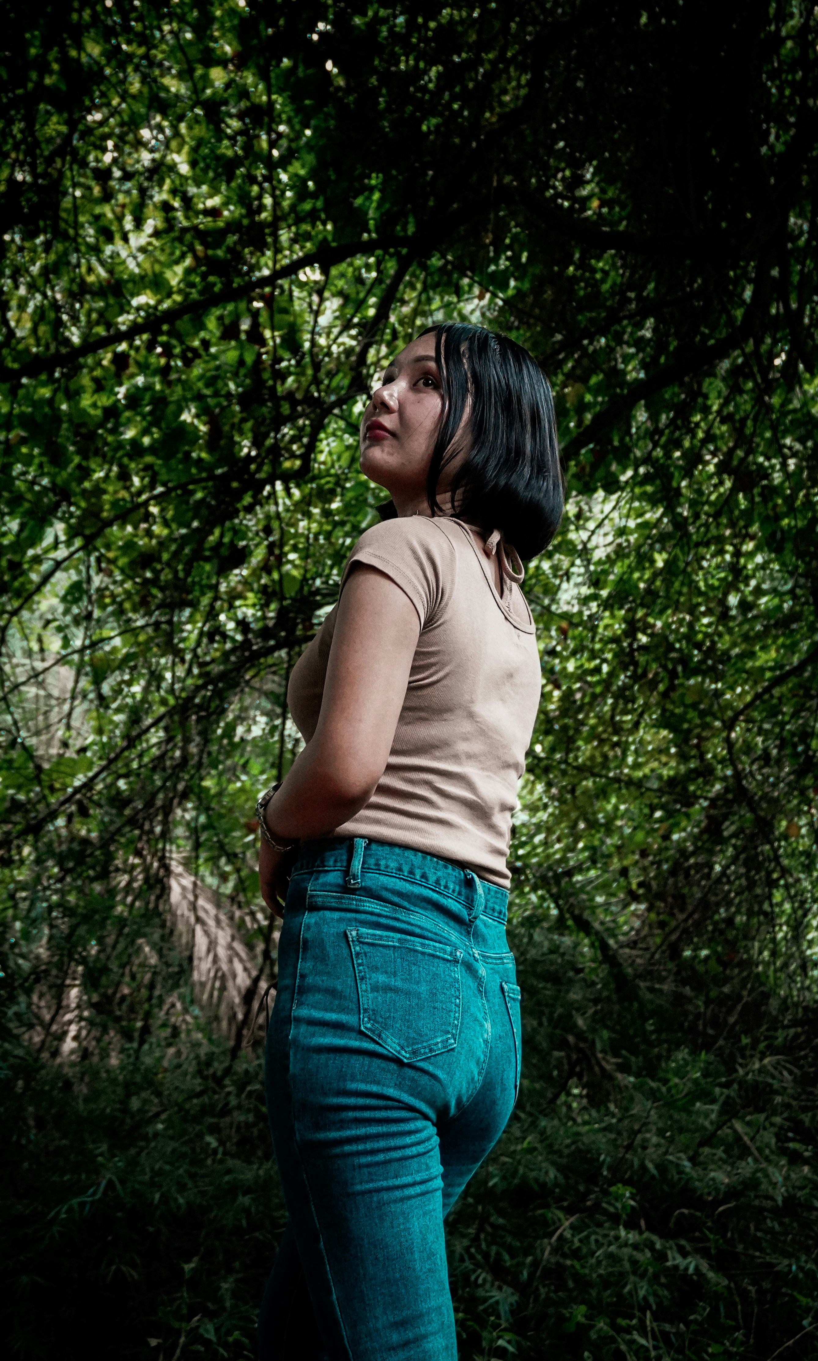 Portrait in Green Canopy: A Quiet Turn Toward Light