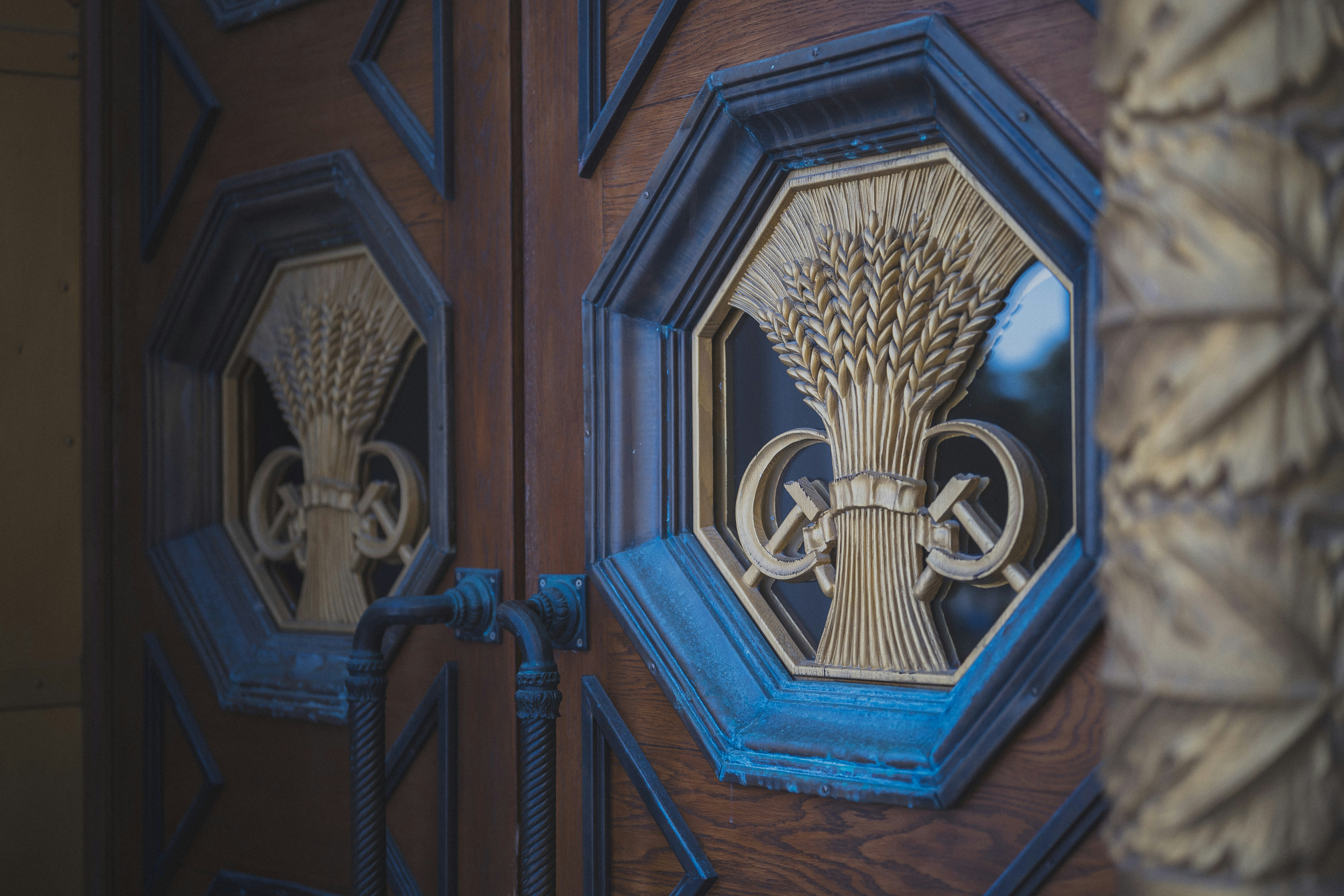 Wheatcrest Emblem on Carved Door Panels