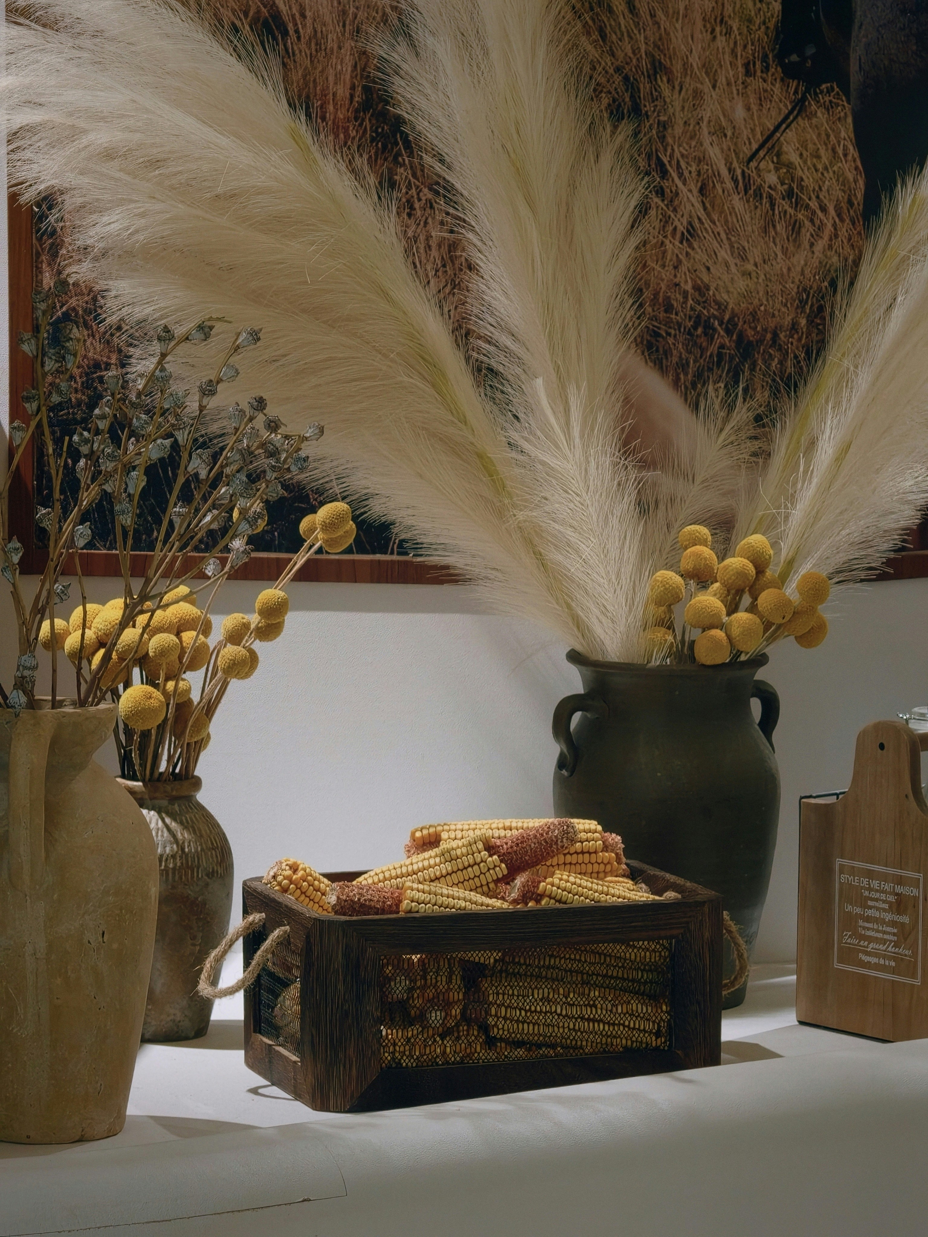 Corn on Display: Rustic Arrangements and Golden Orbs