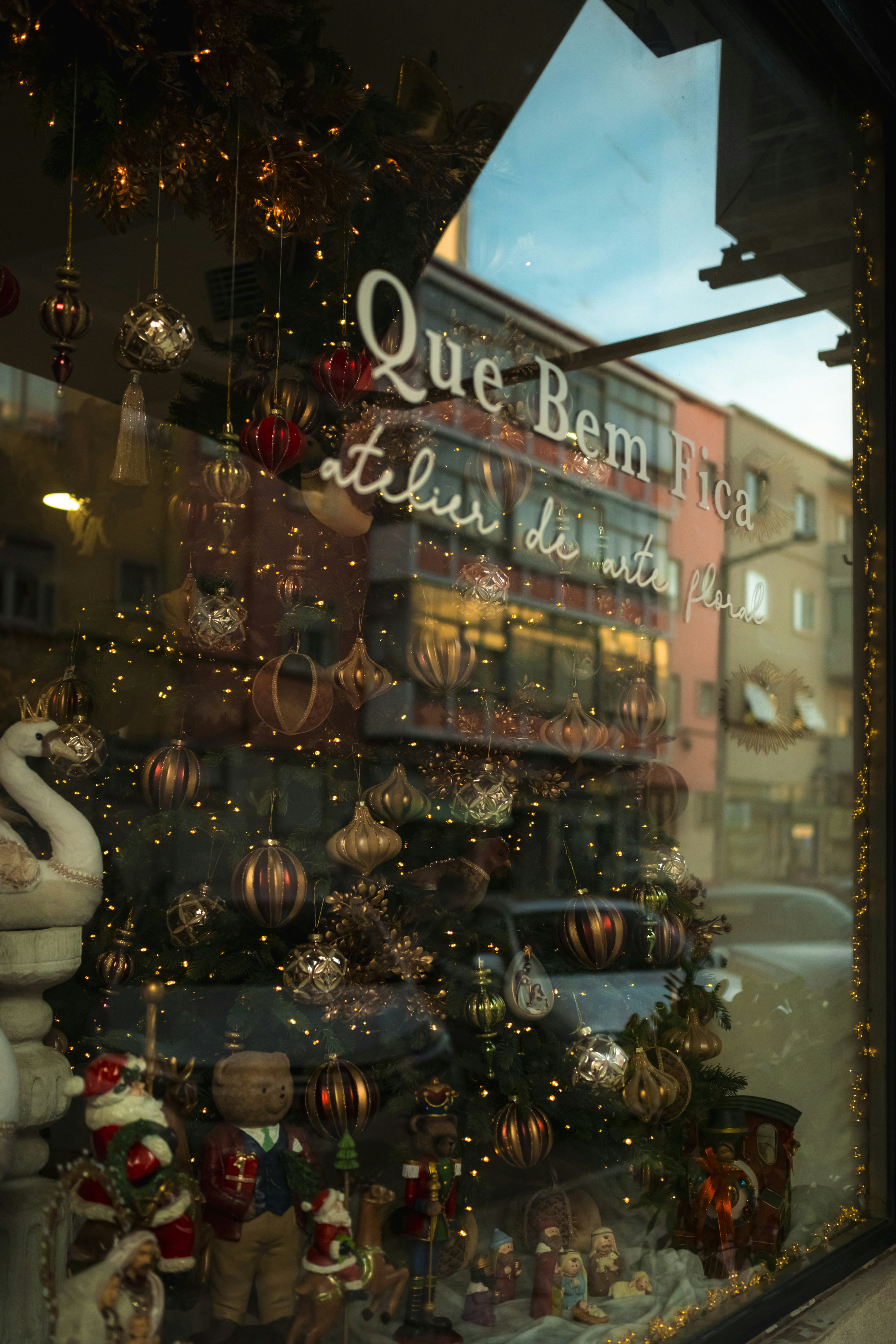 Window of Glimmering Ornaments and festive reflections