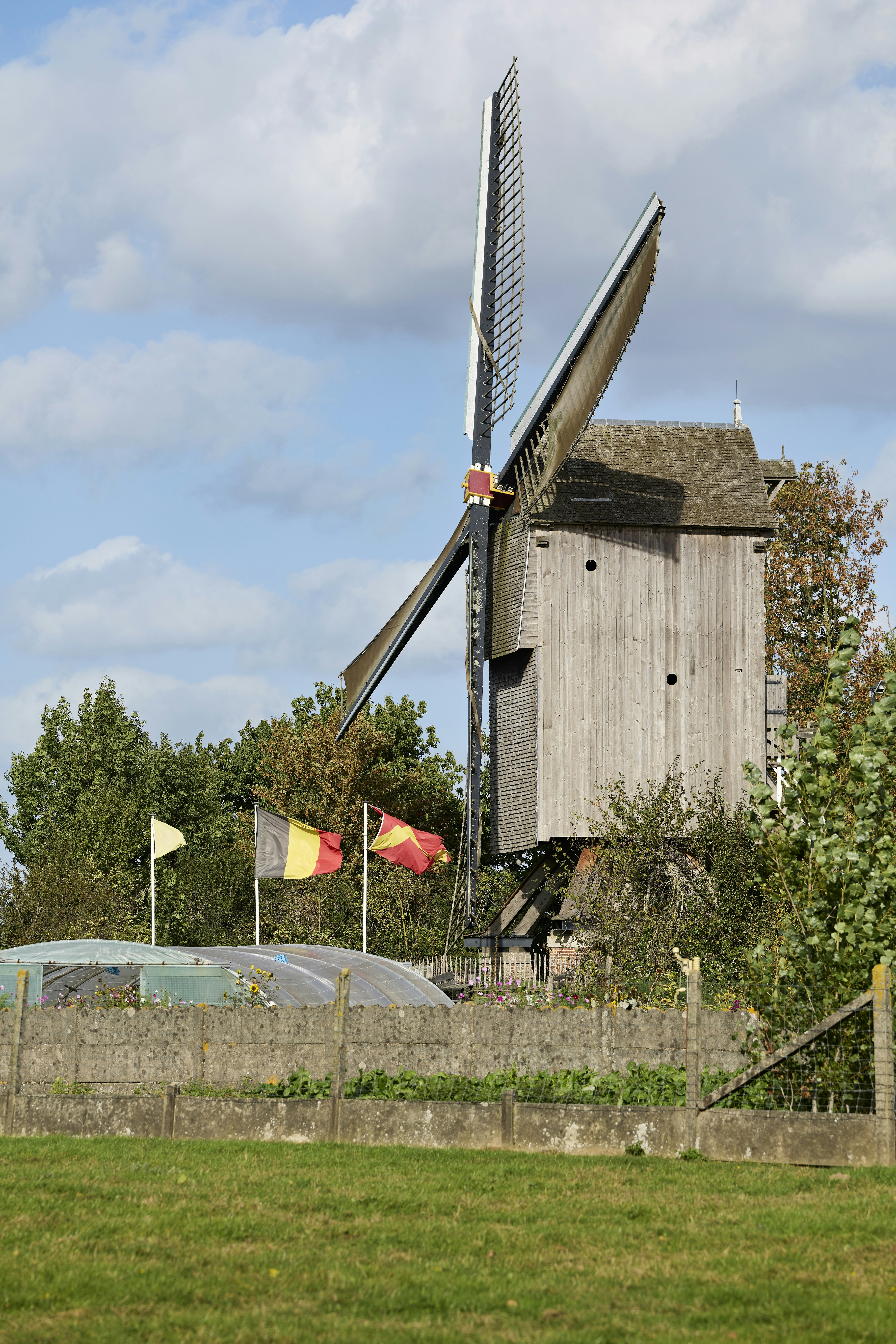 Whispering Blades: A Rustic Windmill with a Quiet Skyline
