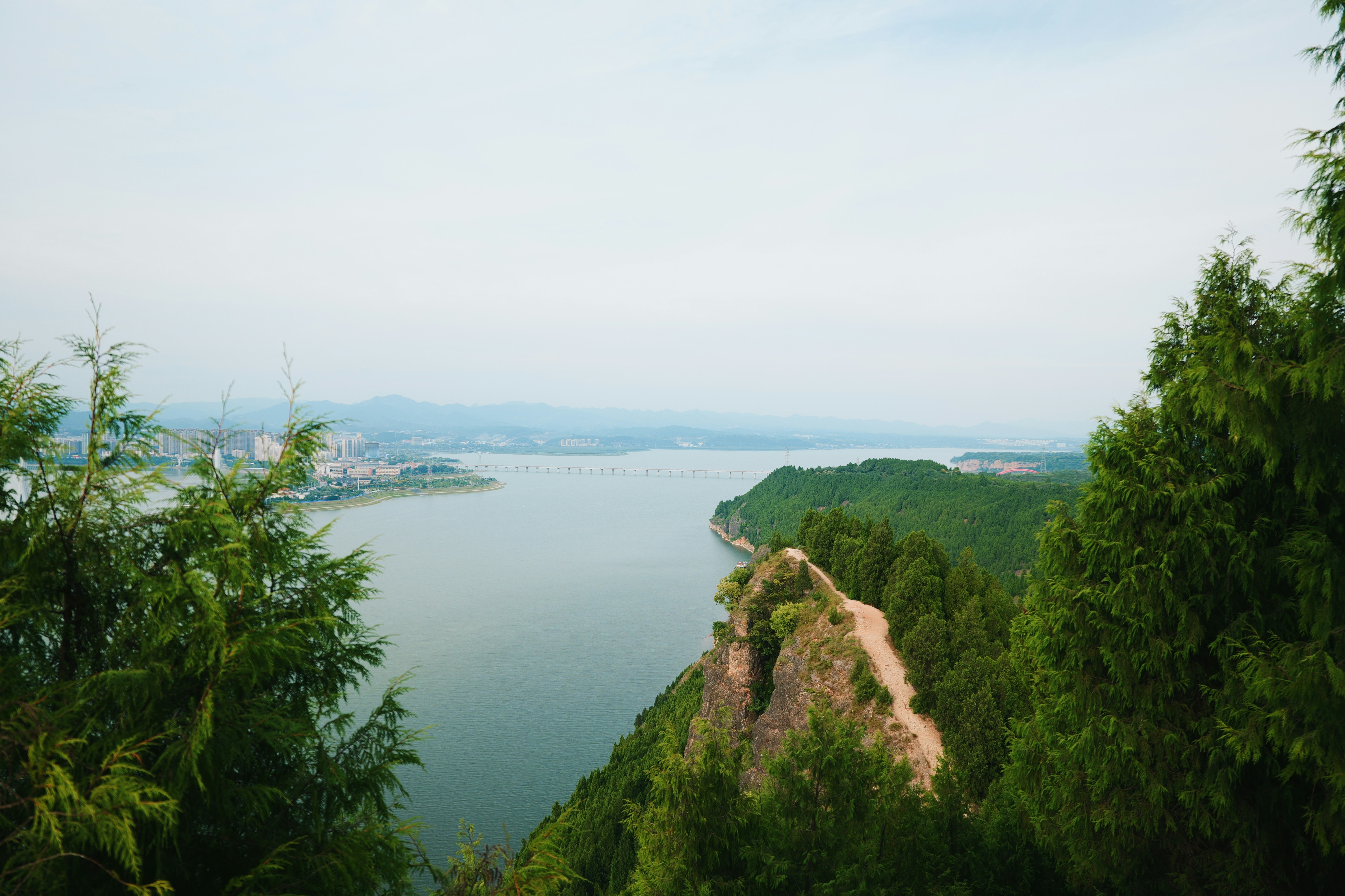 Verdant Ridge Overlooking a Serene River Valley