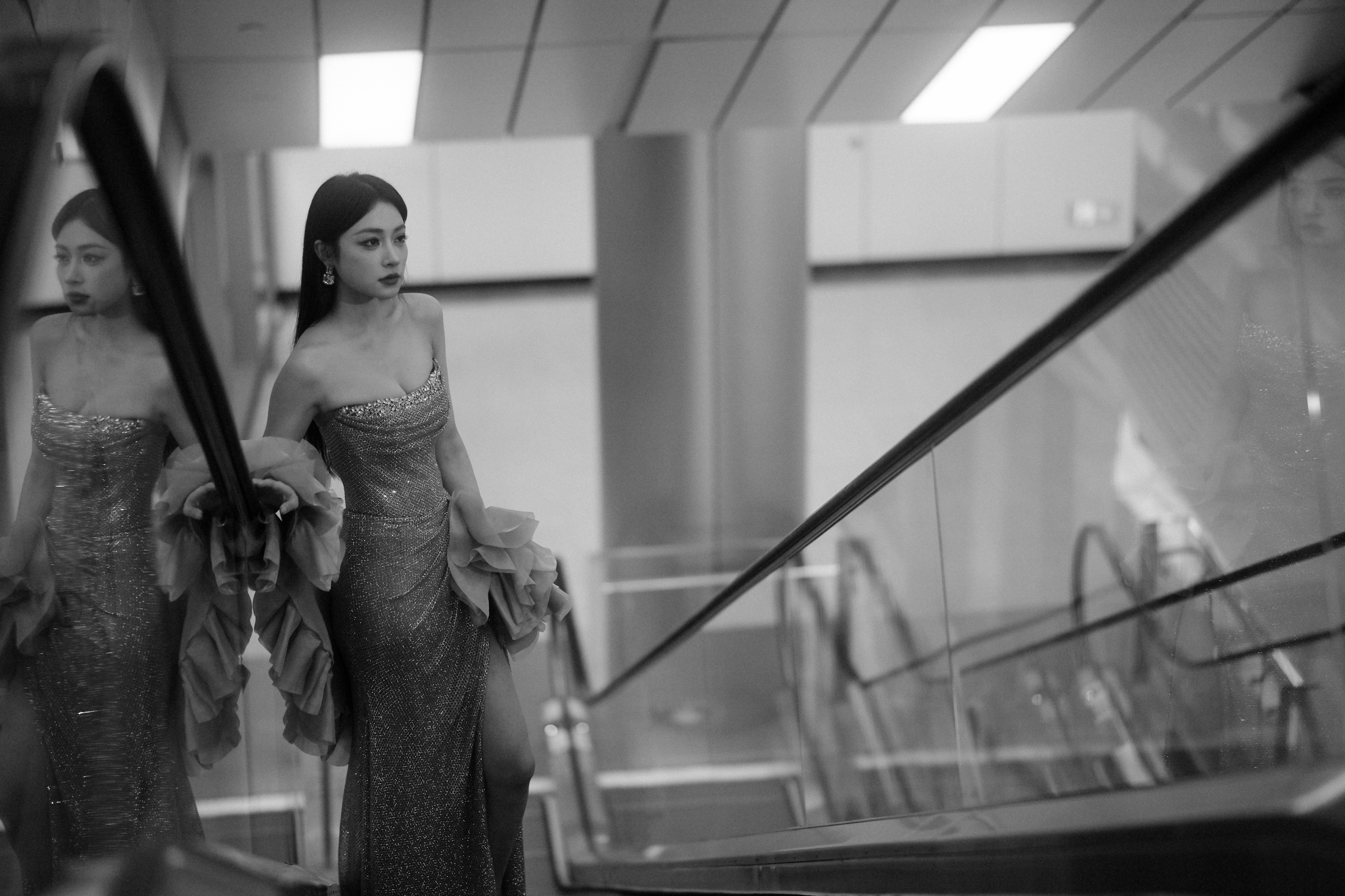 Twin Reflections: A Glacial Moment at the Escalator