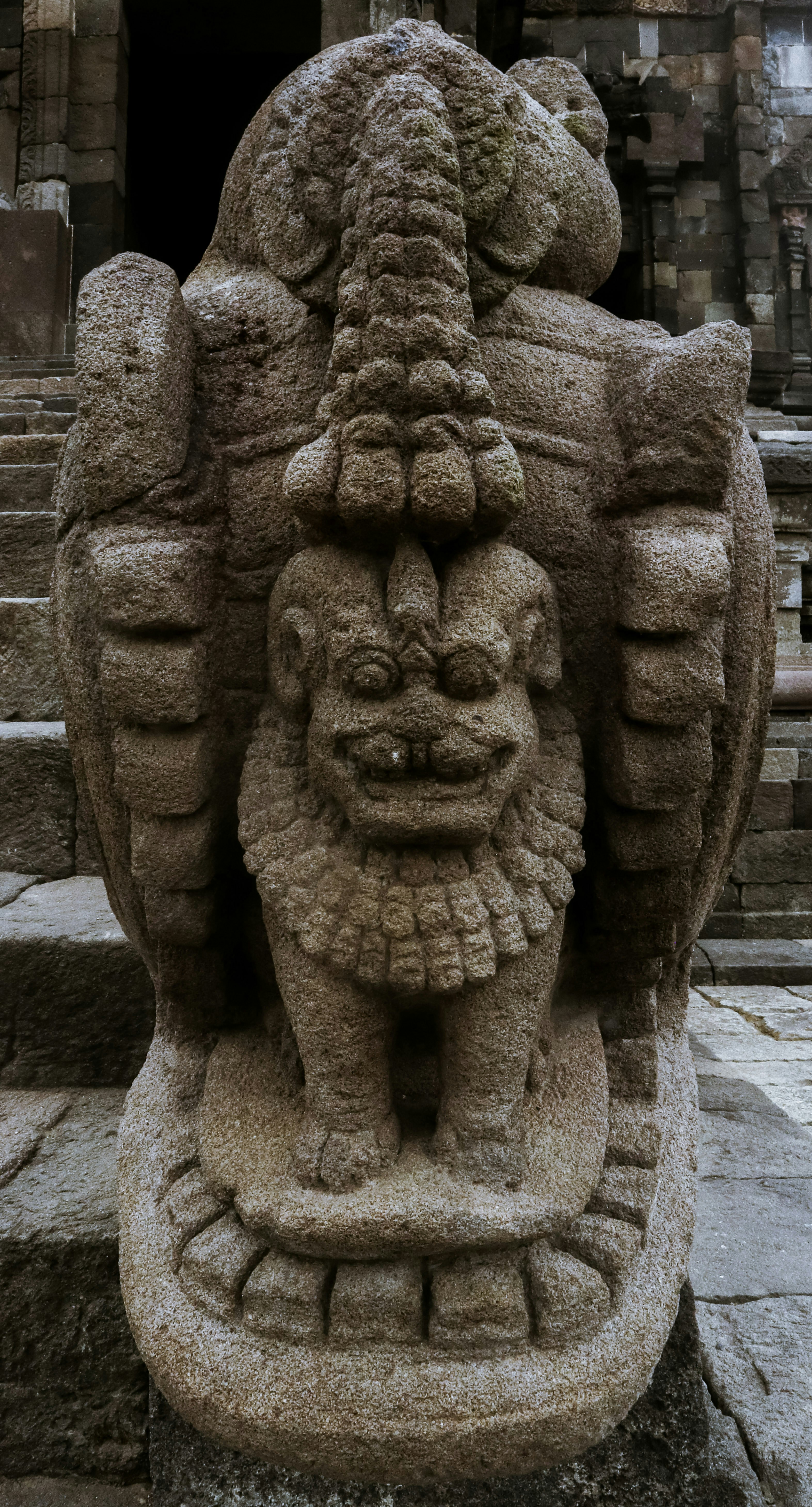 Stone Guardian with Columnar Crest at the Temple Steps