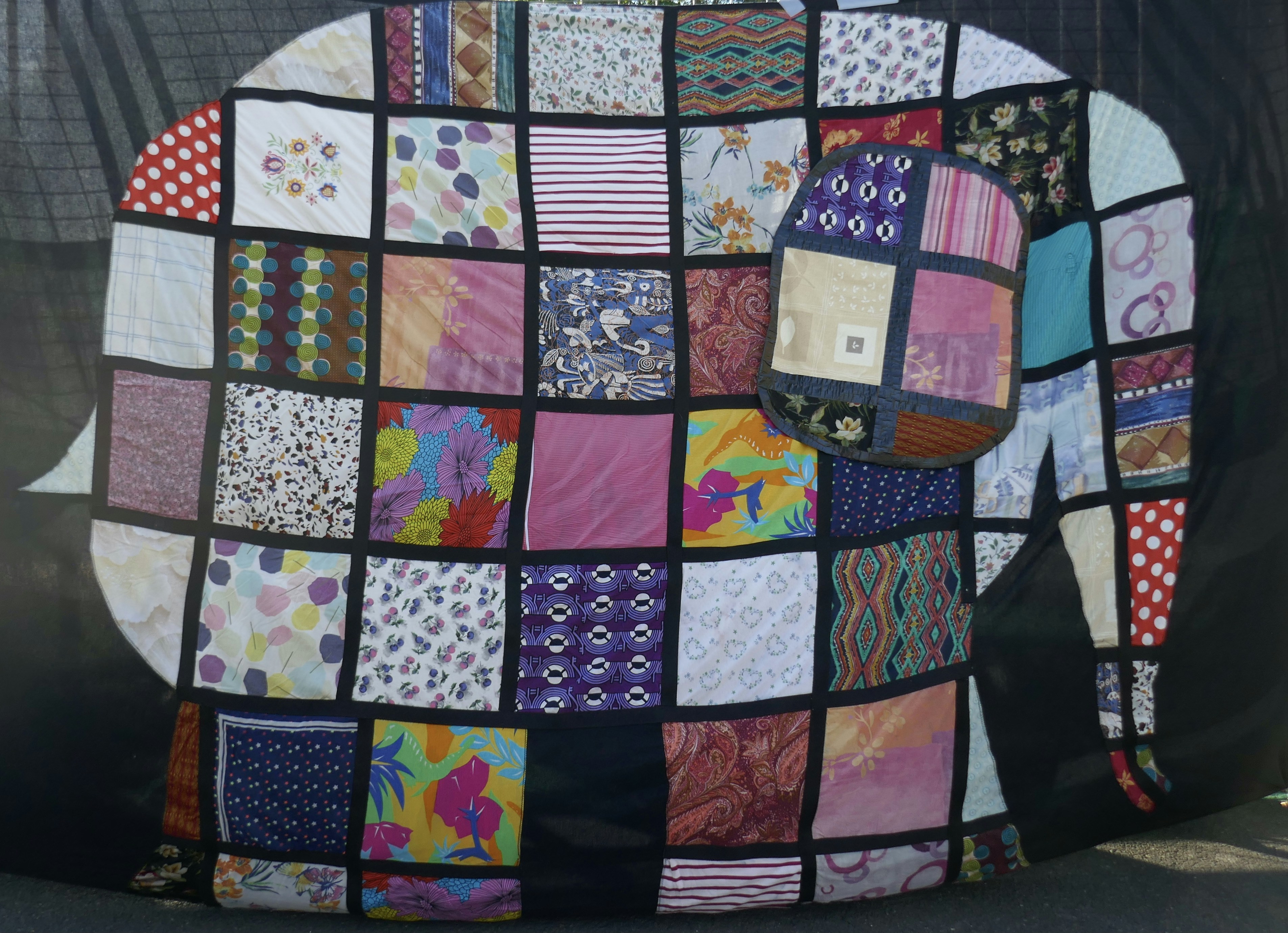 Patchwork Giant: A Quilted Elephant Adorned in Color and Pattern