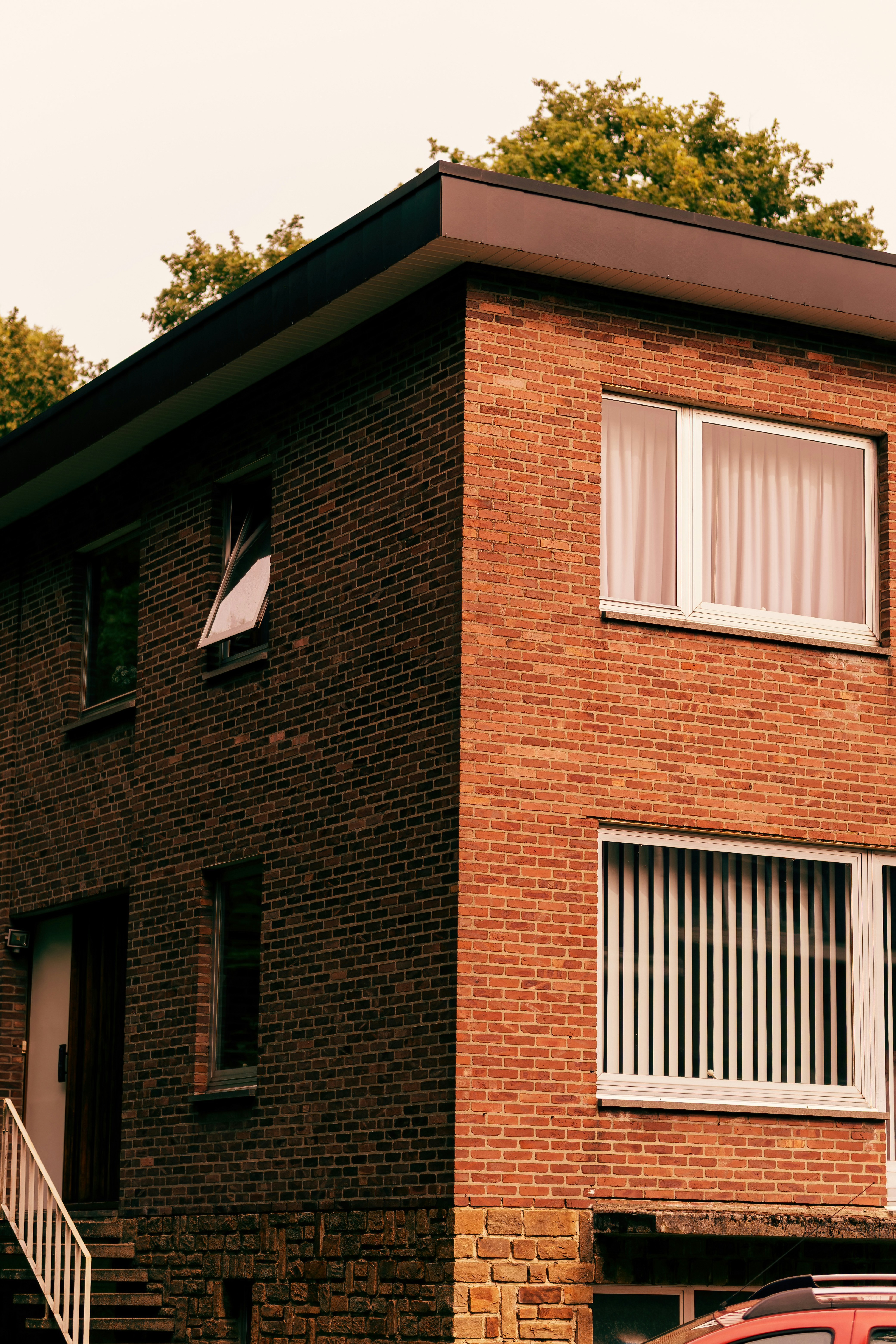 Brick Facade at Dusk: A Quiet Corner of a Residential Building