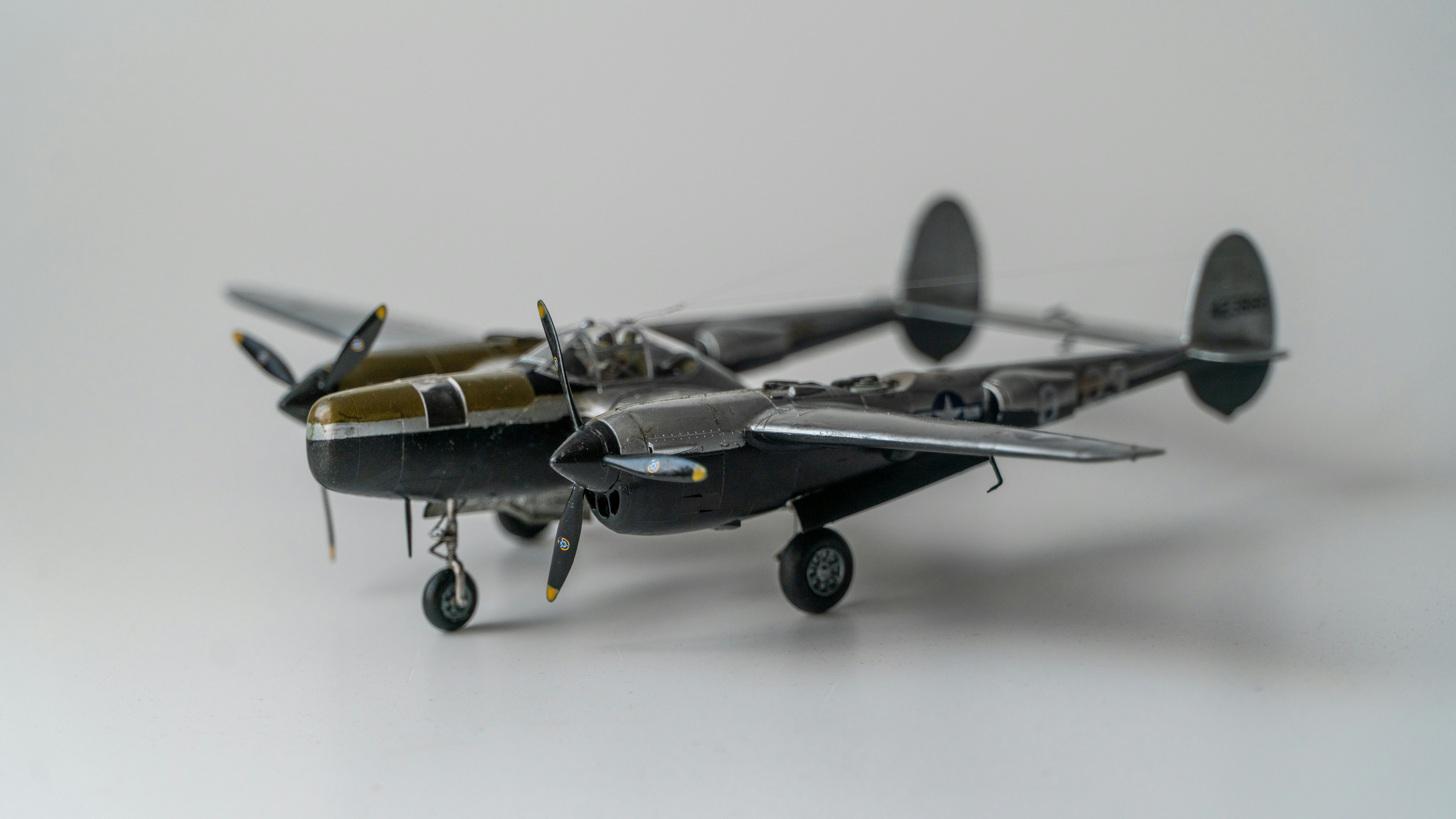 Miniature propeller Alpine: a detailed warbird model photographed on a pale studio backdrop