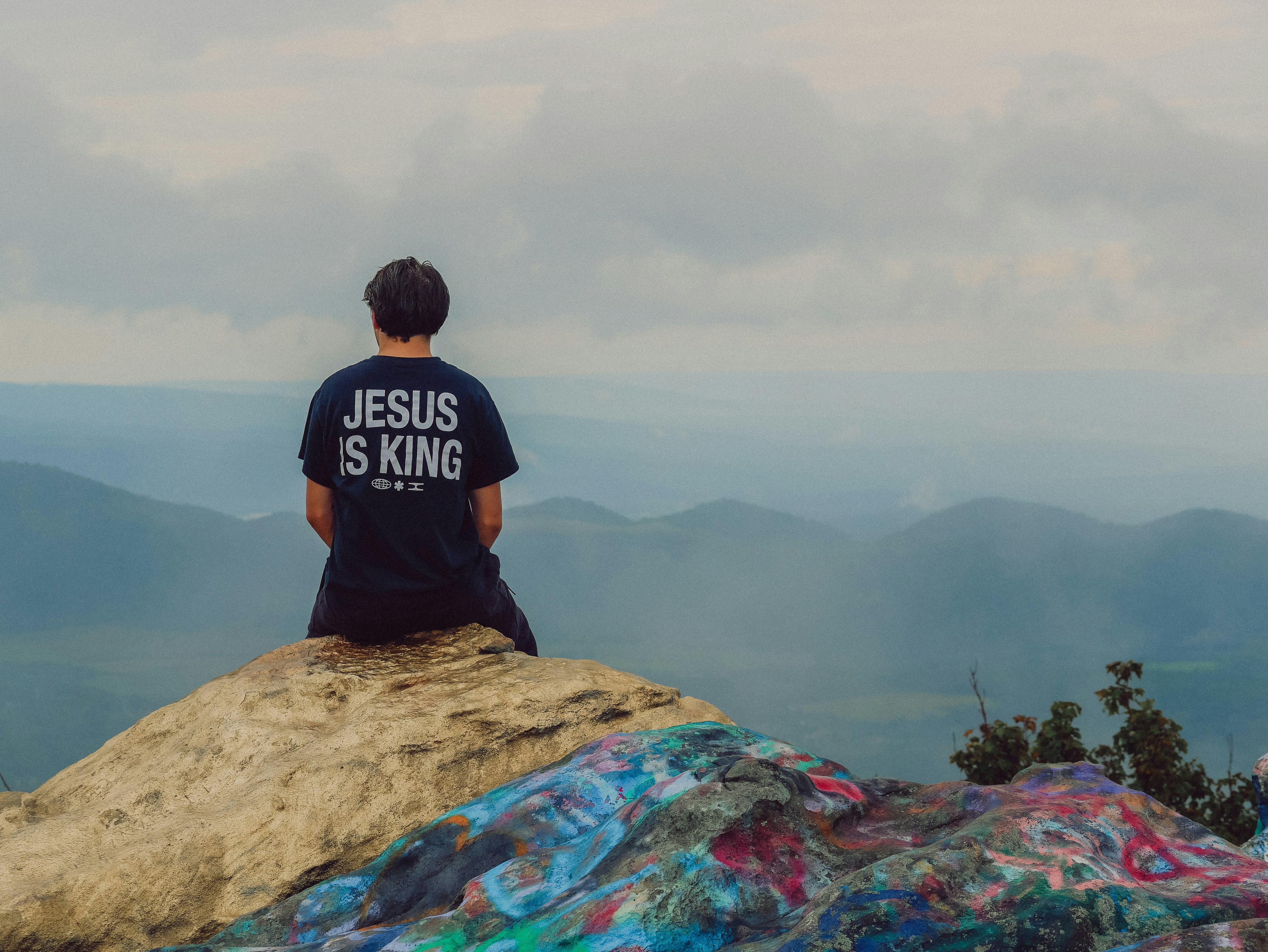 On the Summit: A Quiet Moment with the Message on the Back