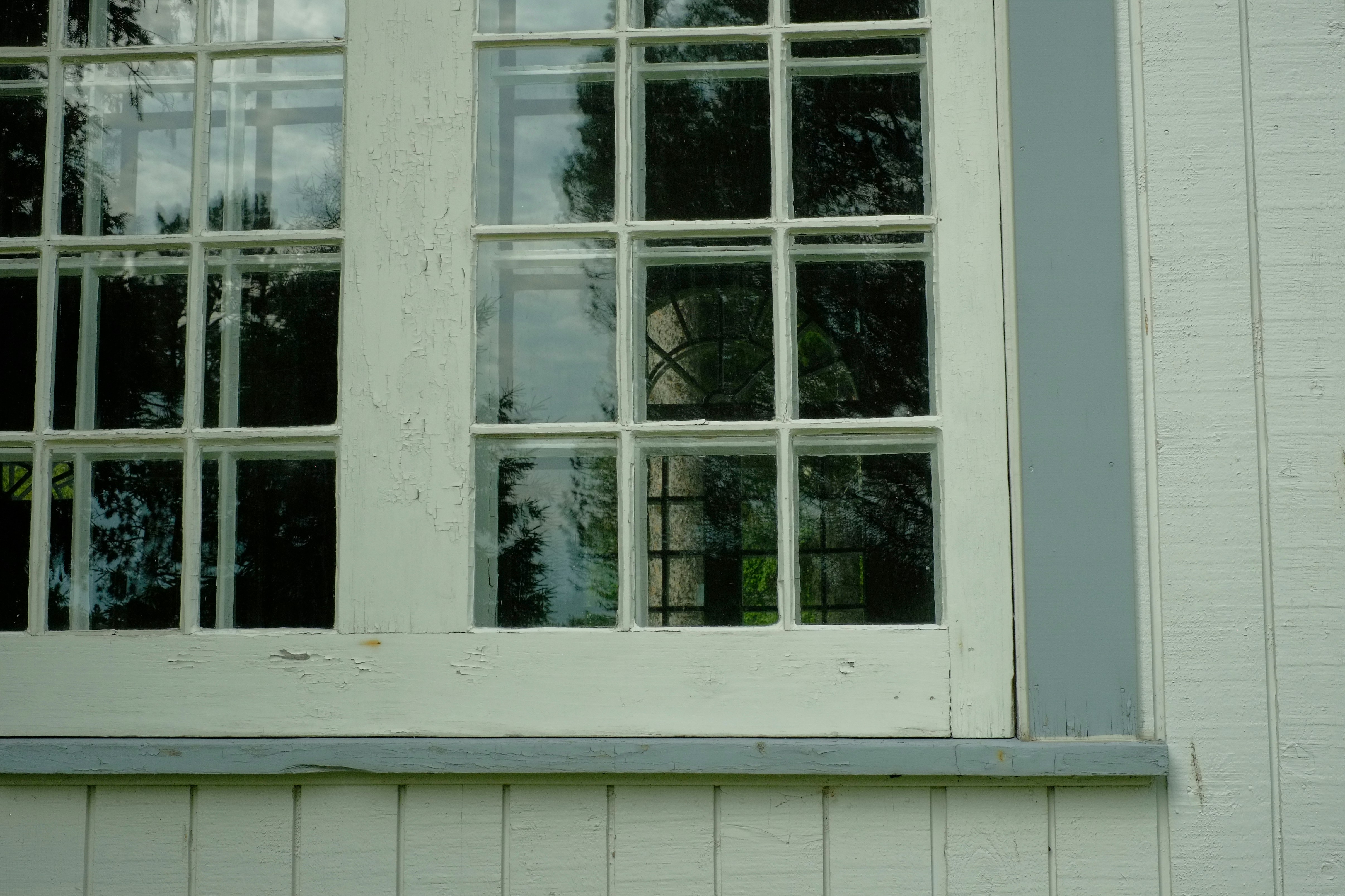 Weathered Windowpanes: Quiet Geometry of Light and Wood