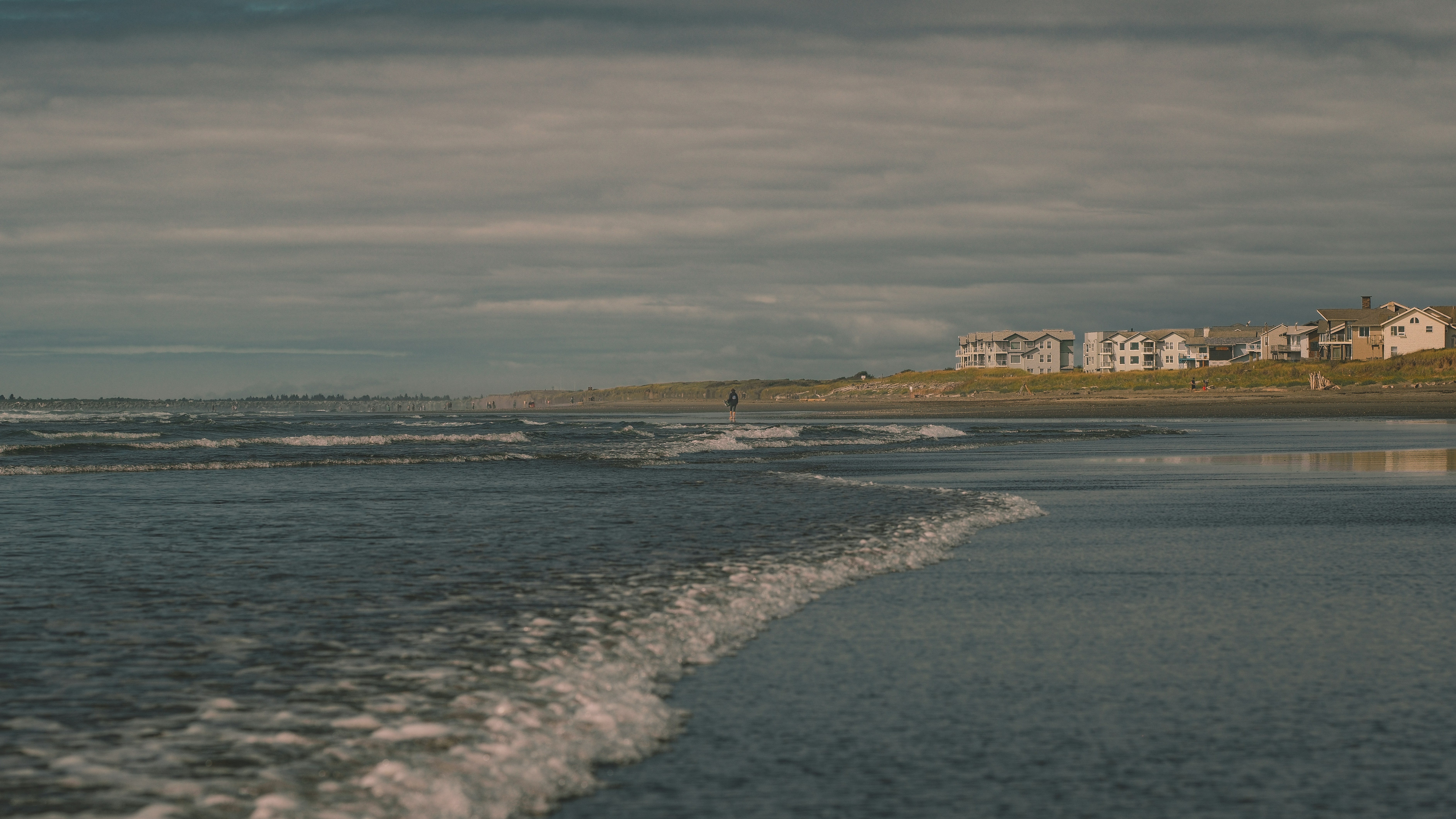 Coastal Line: Waves Meet Homes on the Horizon
