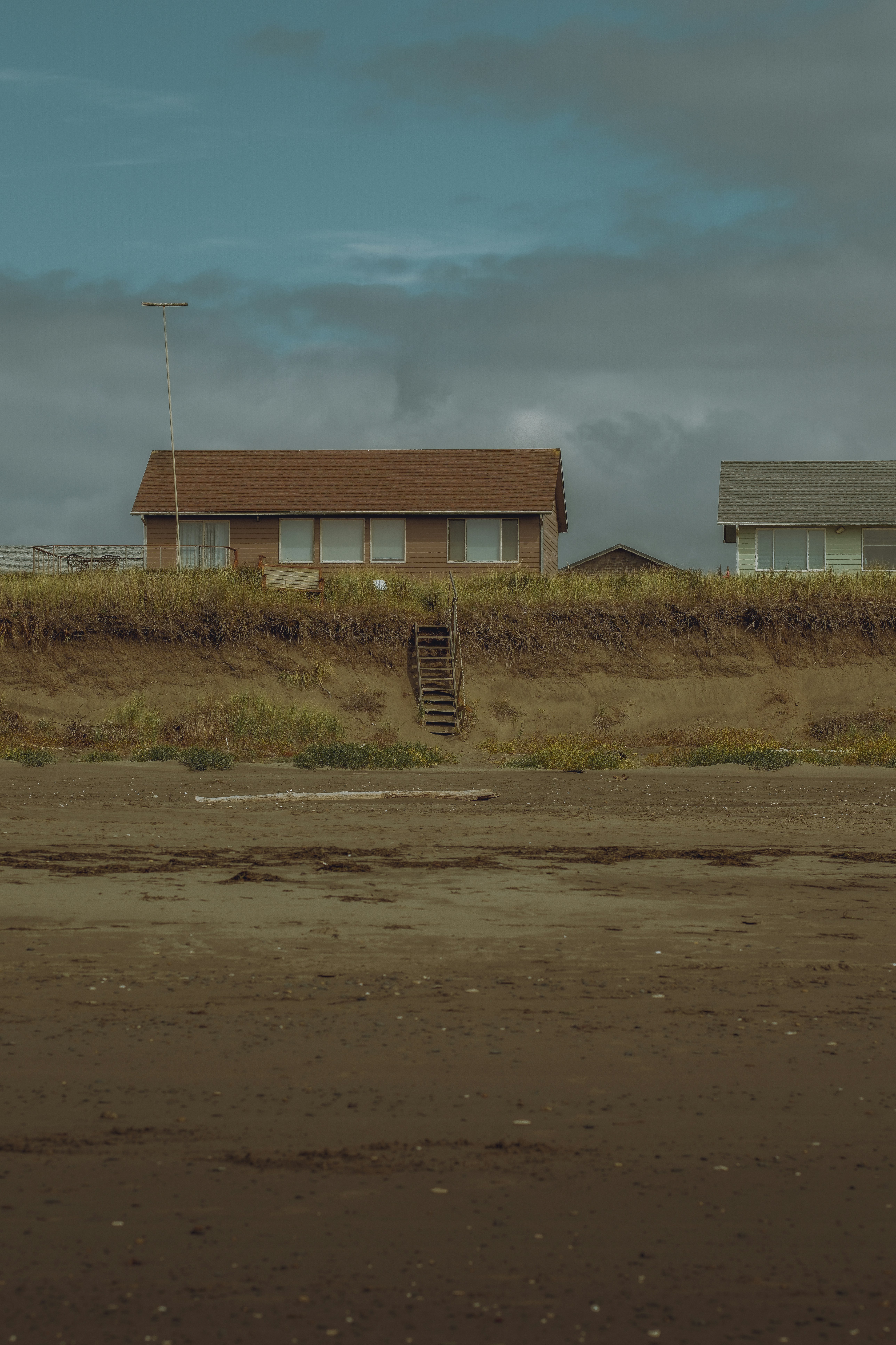 Dunes and Dwellings: Quiet Coastal Row