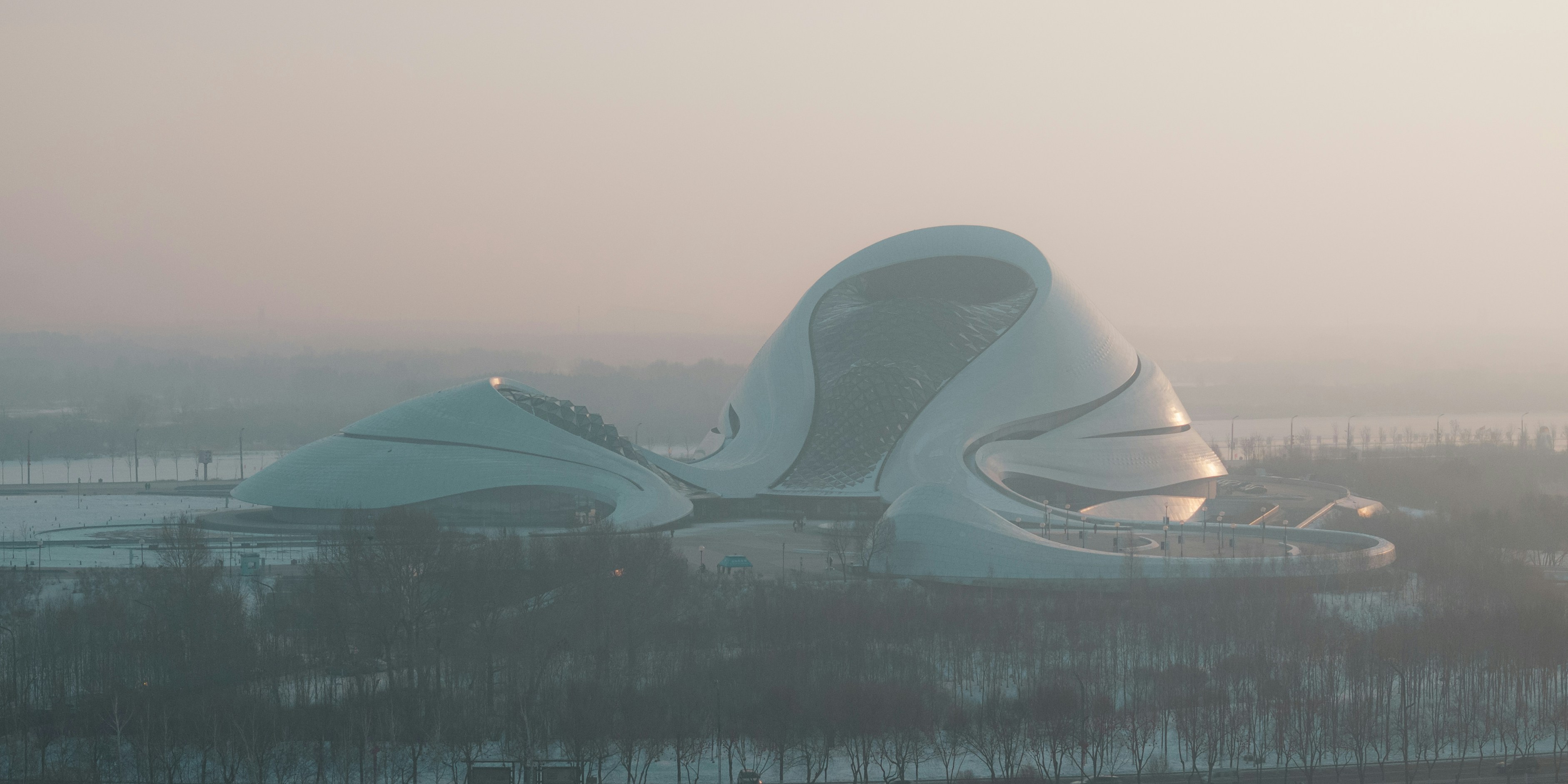 Futuristic Harbour Dome: a serene shoreline with a sculpted white structure