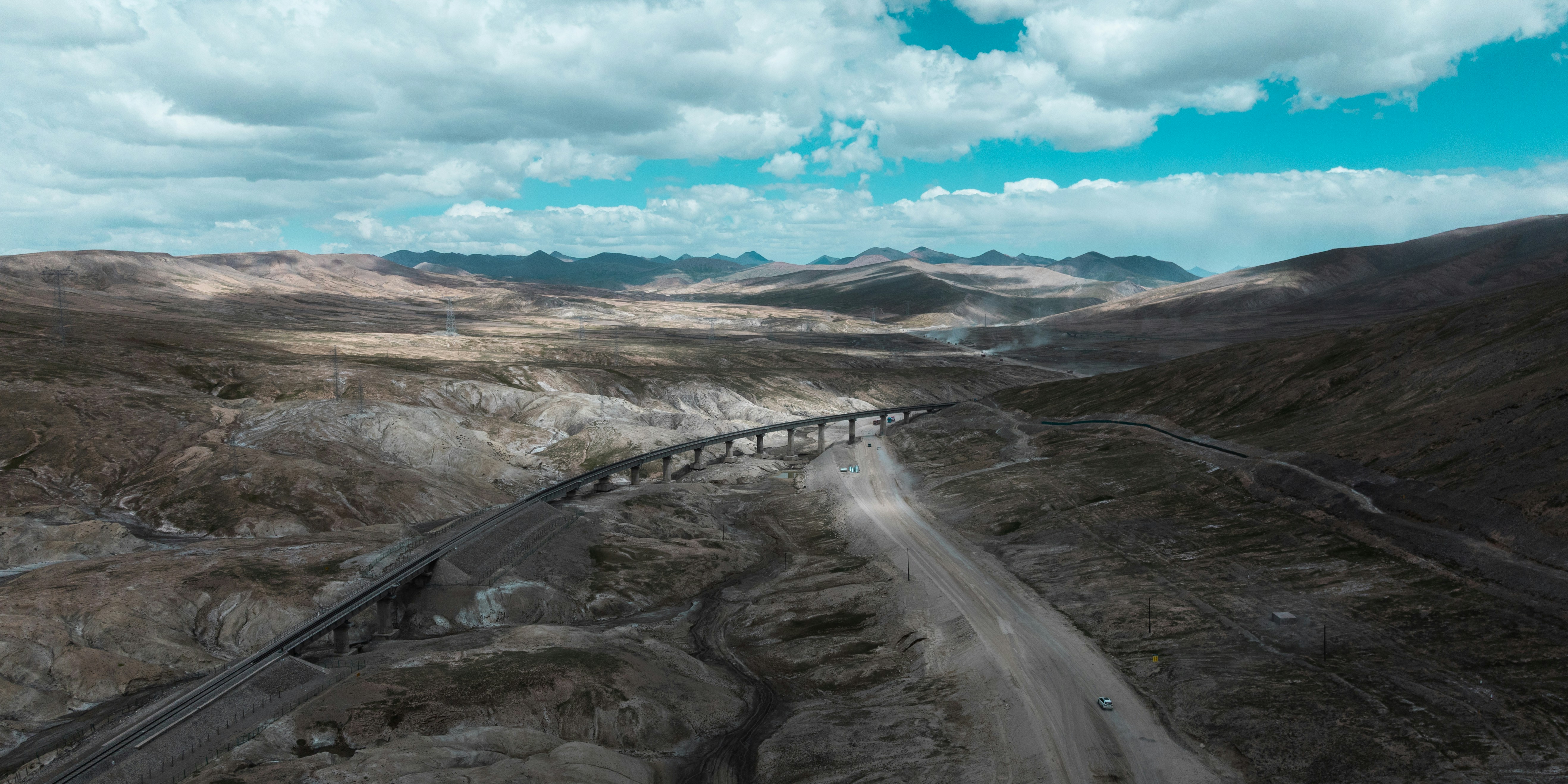 Desert Rail Corridor under Expansive Skies