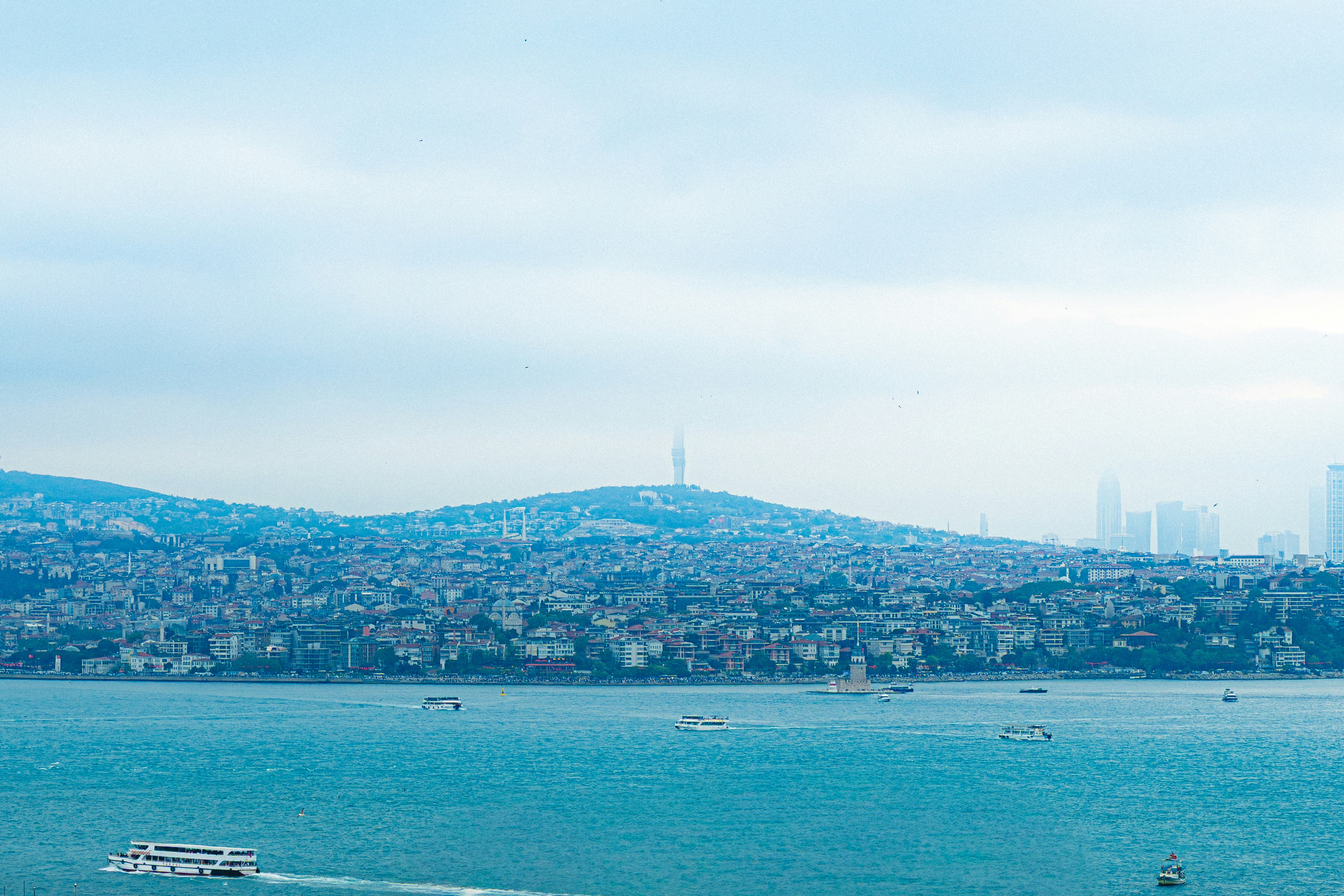 Horizon Line Over a Distant Coastal City Harbor