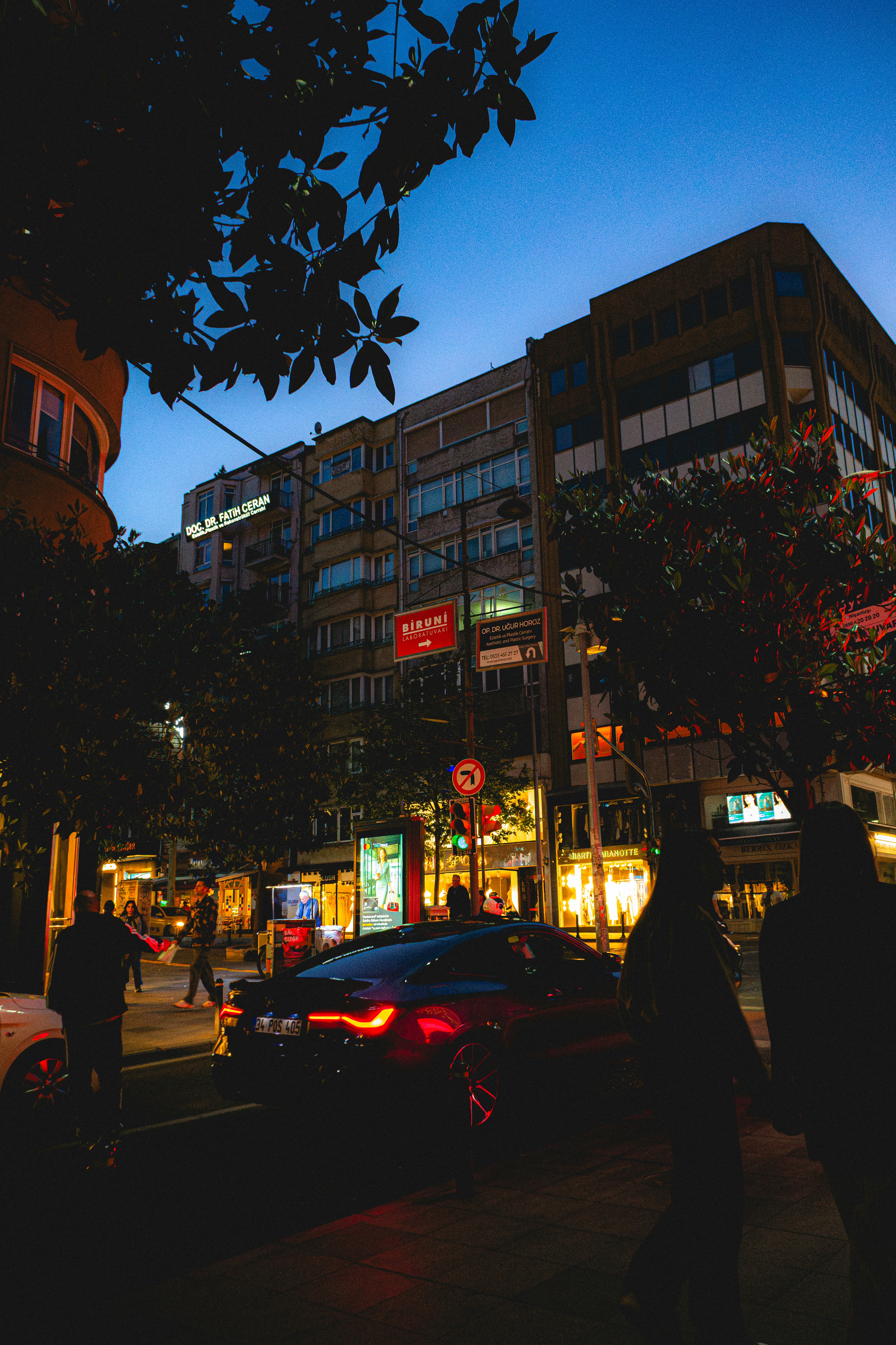 Night Streetrise: Neon Market Echoes Along a City Block