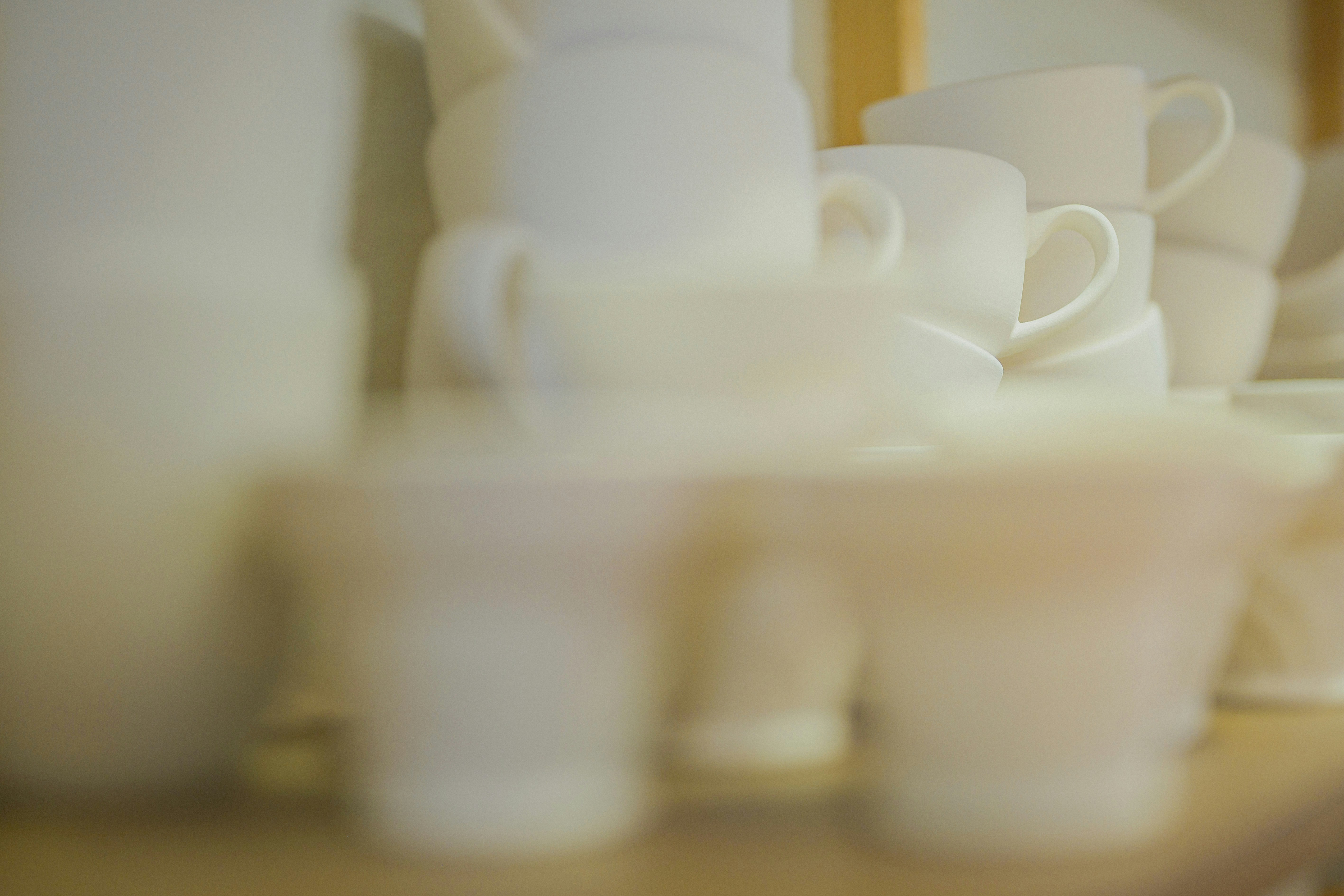 Soft Bloom of Porcelain: A Gentle Blur of Teacups