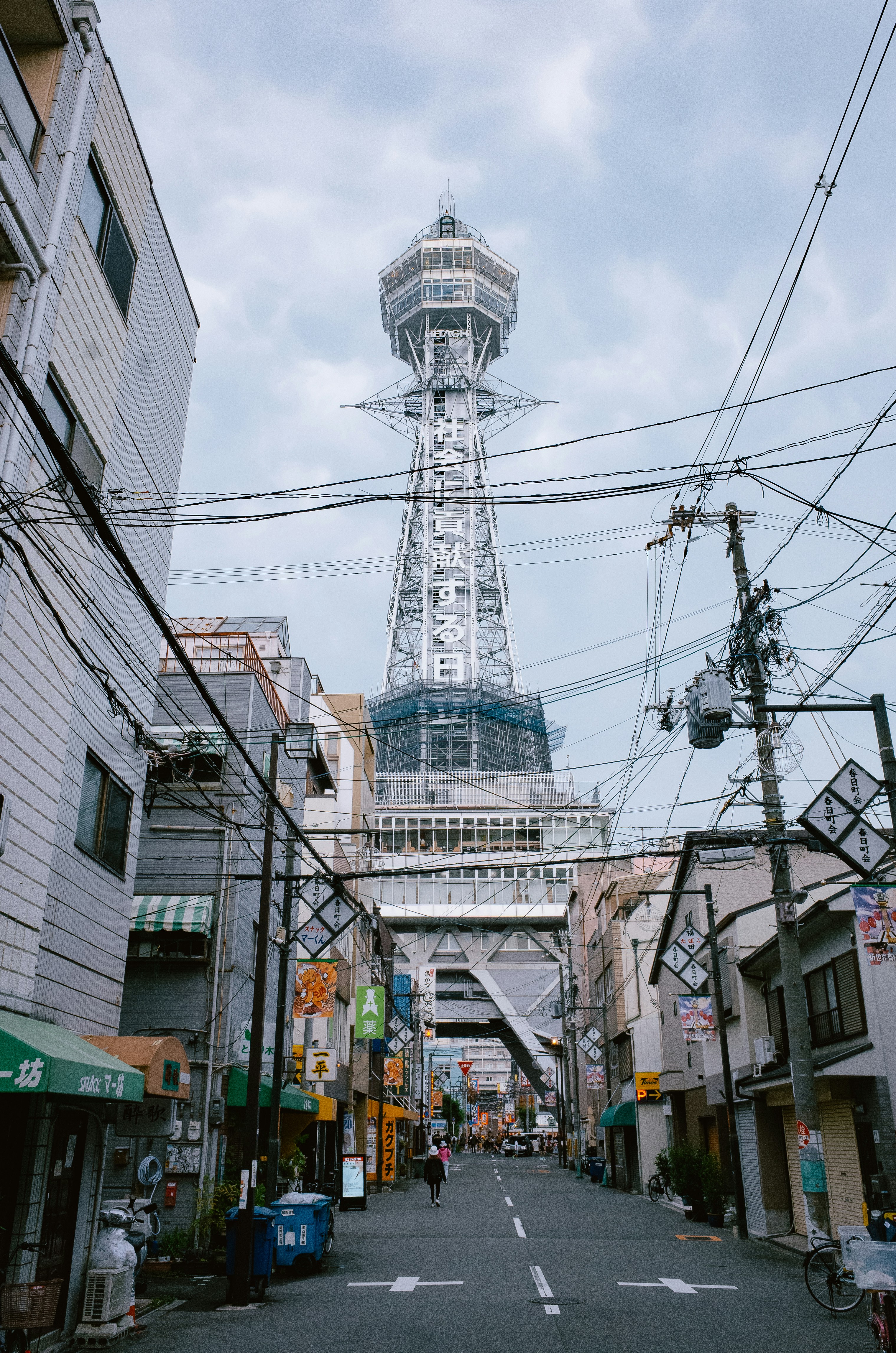 Tokyo Tower Looms Over a Narrow Street