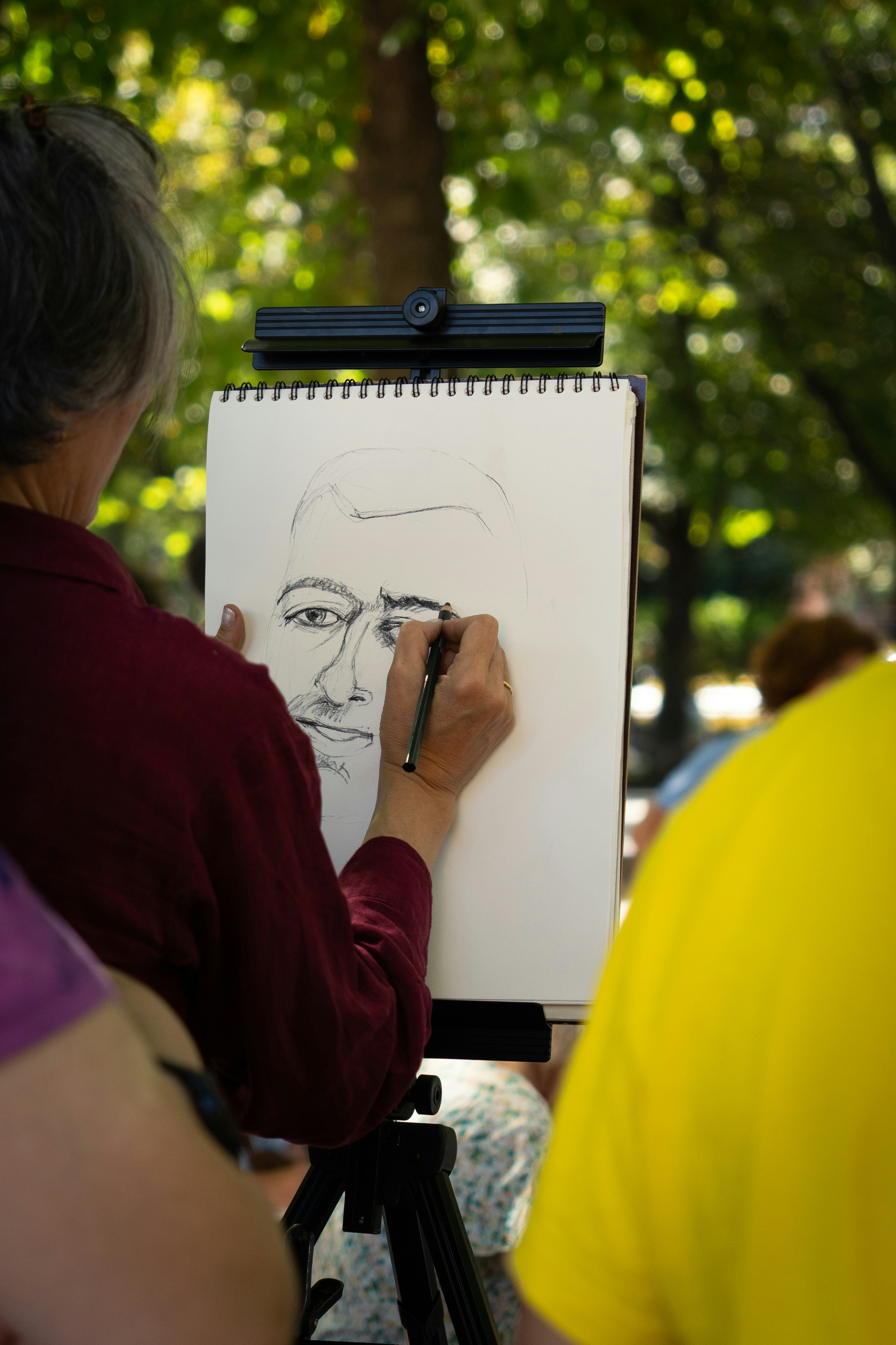 Live Sketch in the Park: Portrait Artist at Work