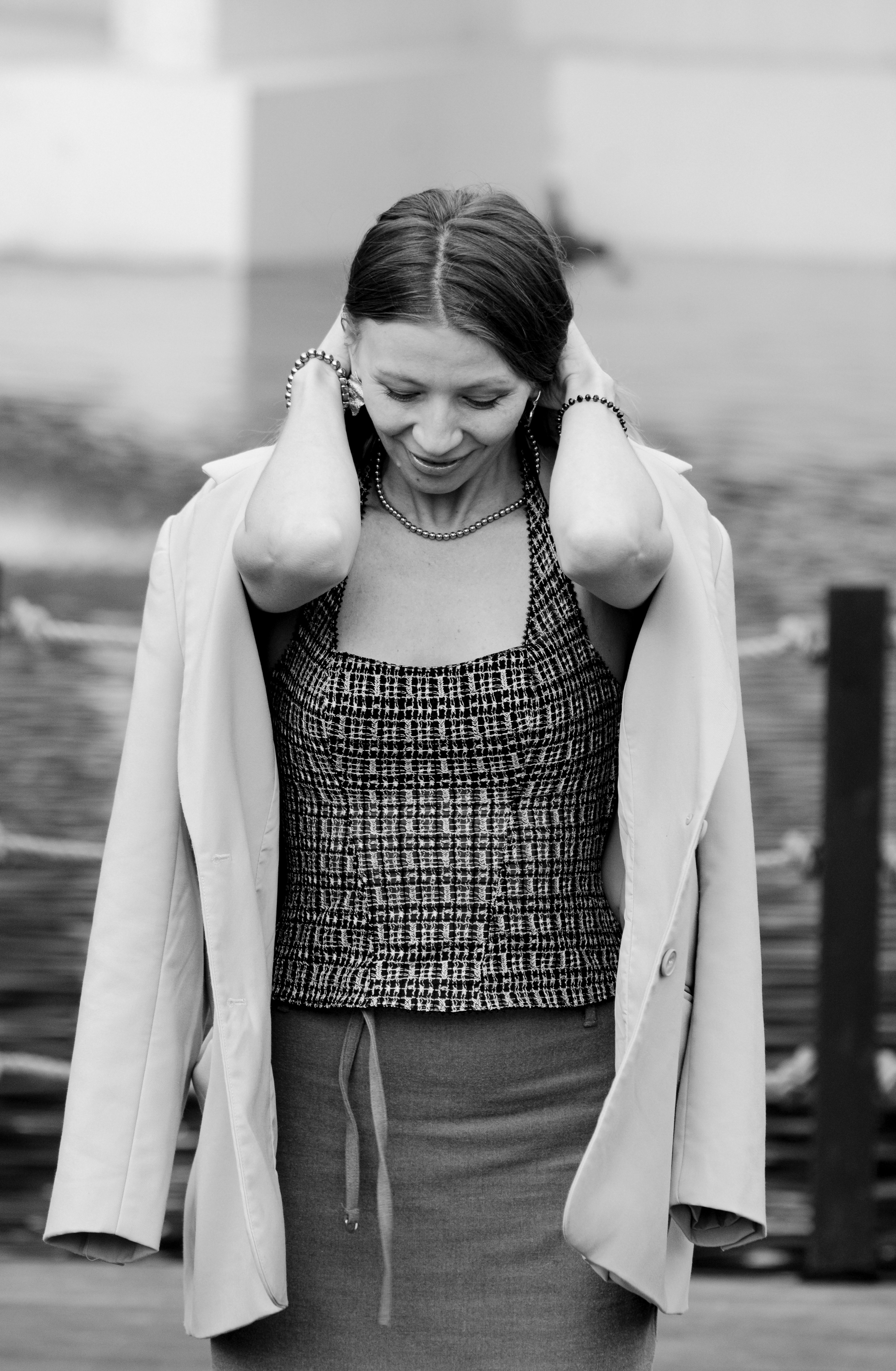 Midday wind: a contemplative portrait on a sunlit pier