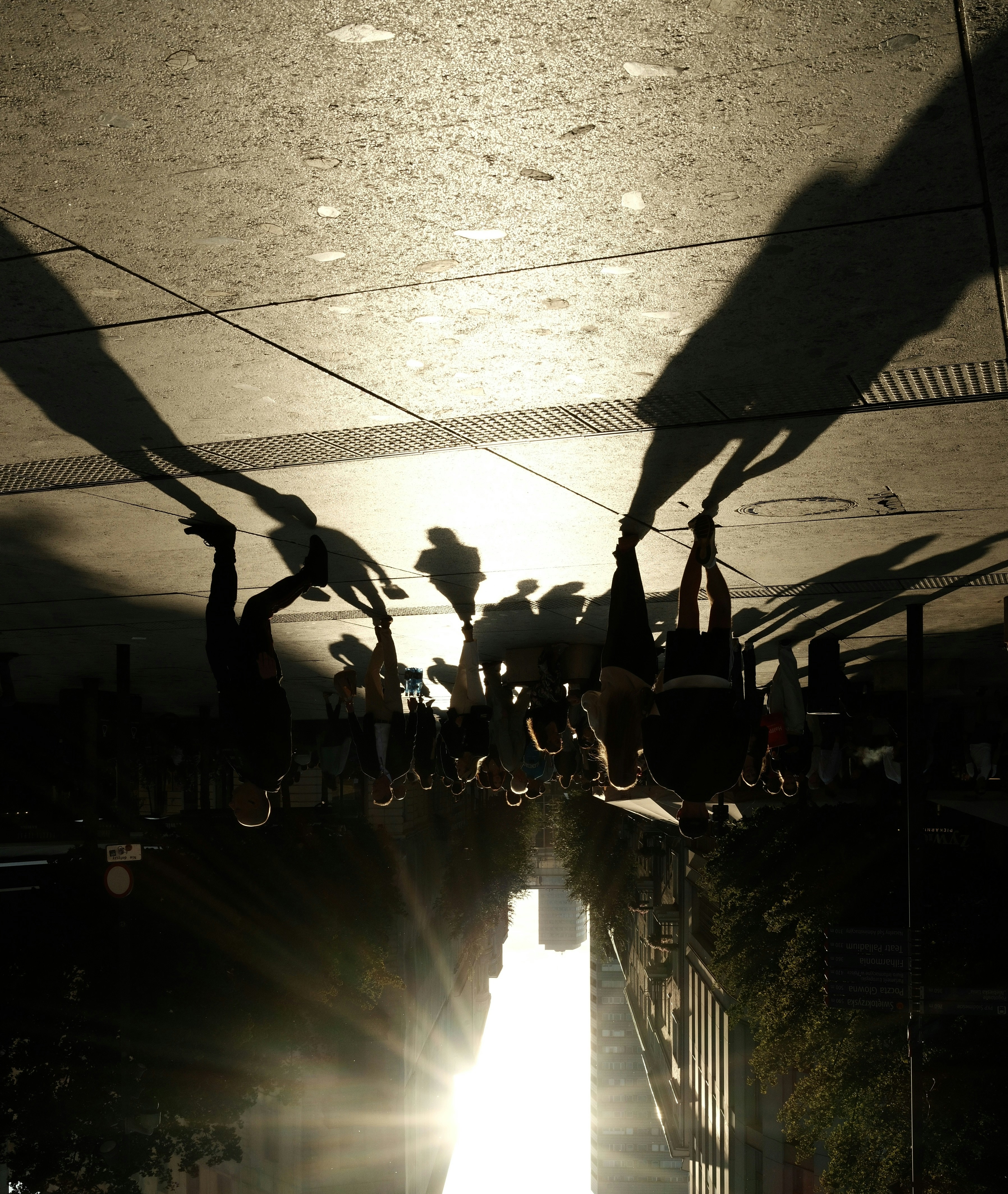 Shadow Parade: silhouettes and sunlit steps contrasted in urban exposure