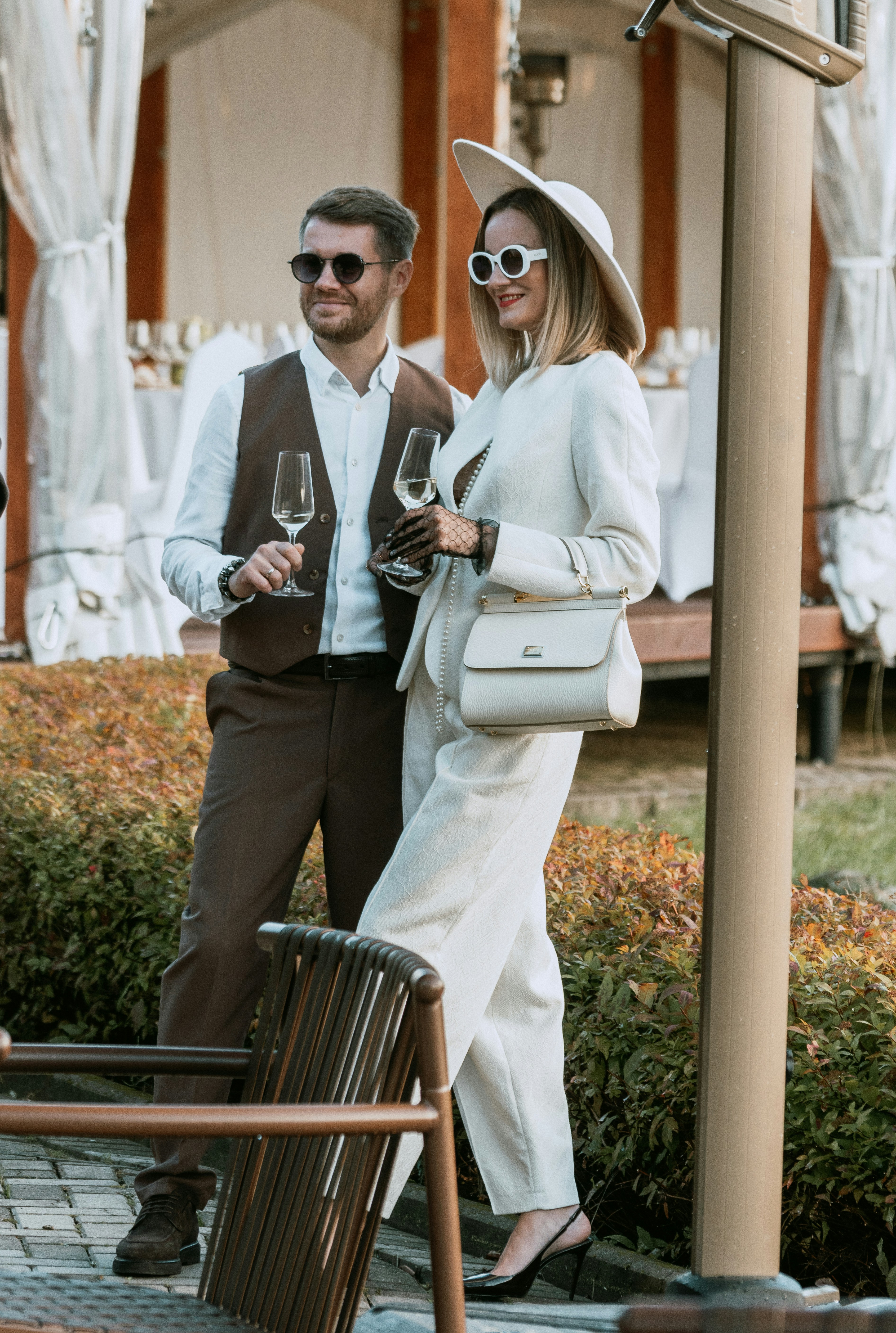 Elegant evening by the terrace: champagne portraits