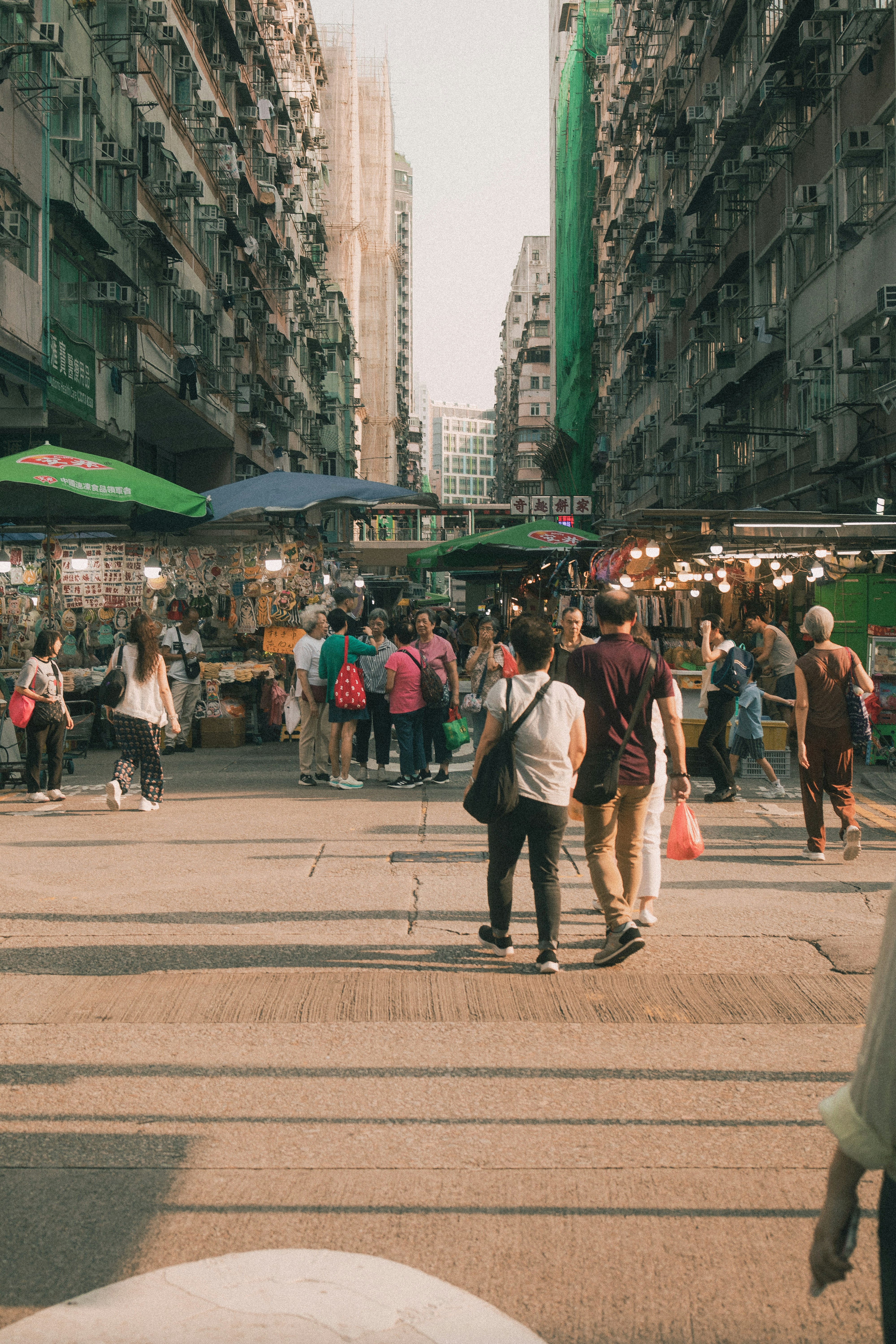 Crossroads of City Life: Market Right Beneath the Towers