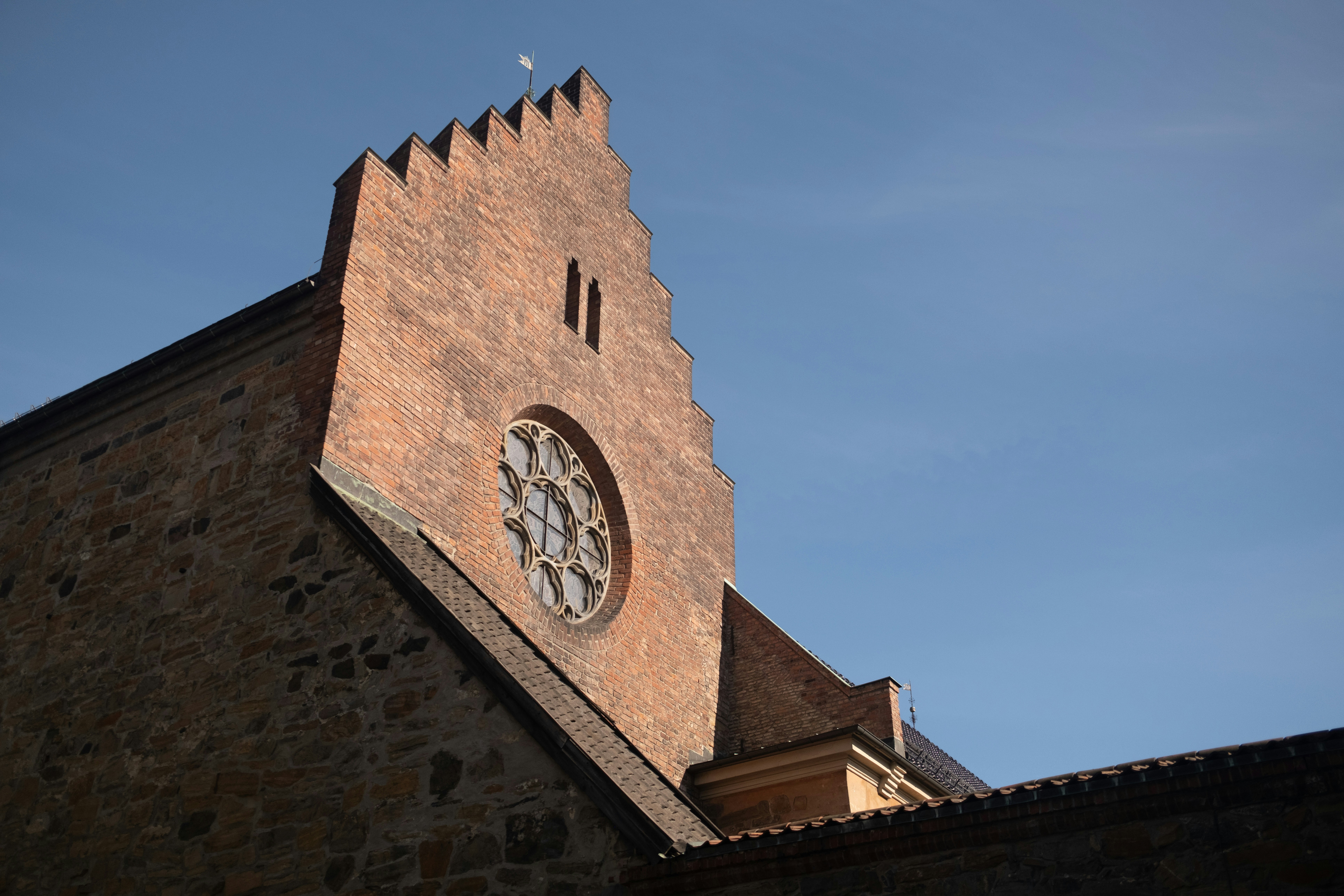 Brick Abbey Facade under Clear Sky