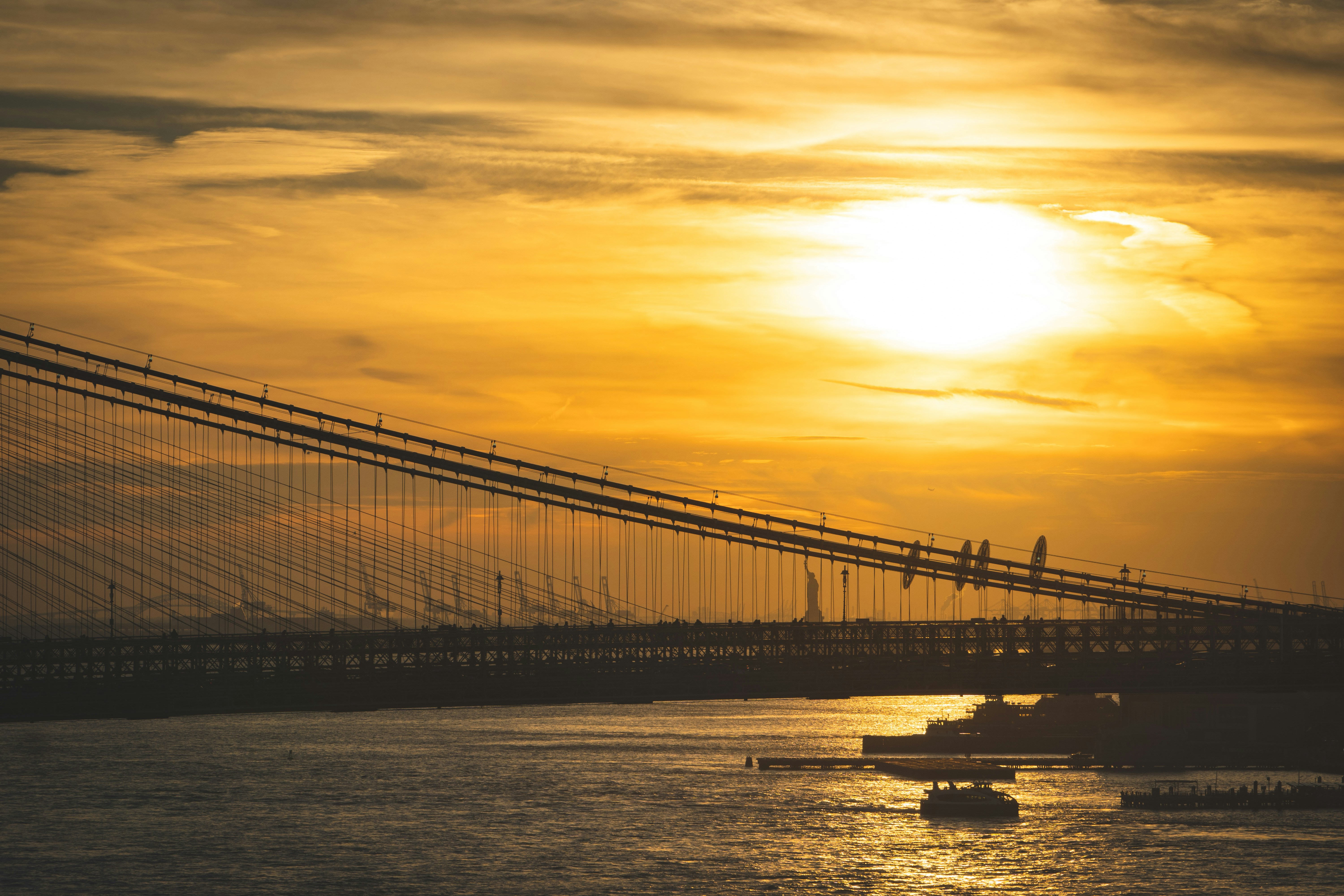 Golden Span at Dusk: A Bridge Cut by Sunset