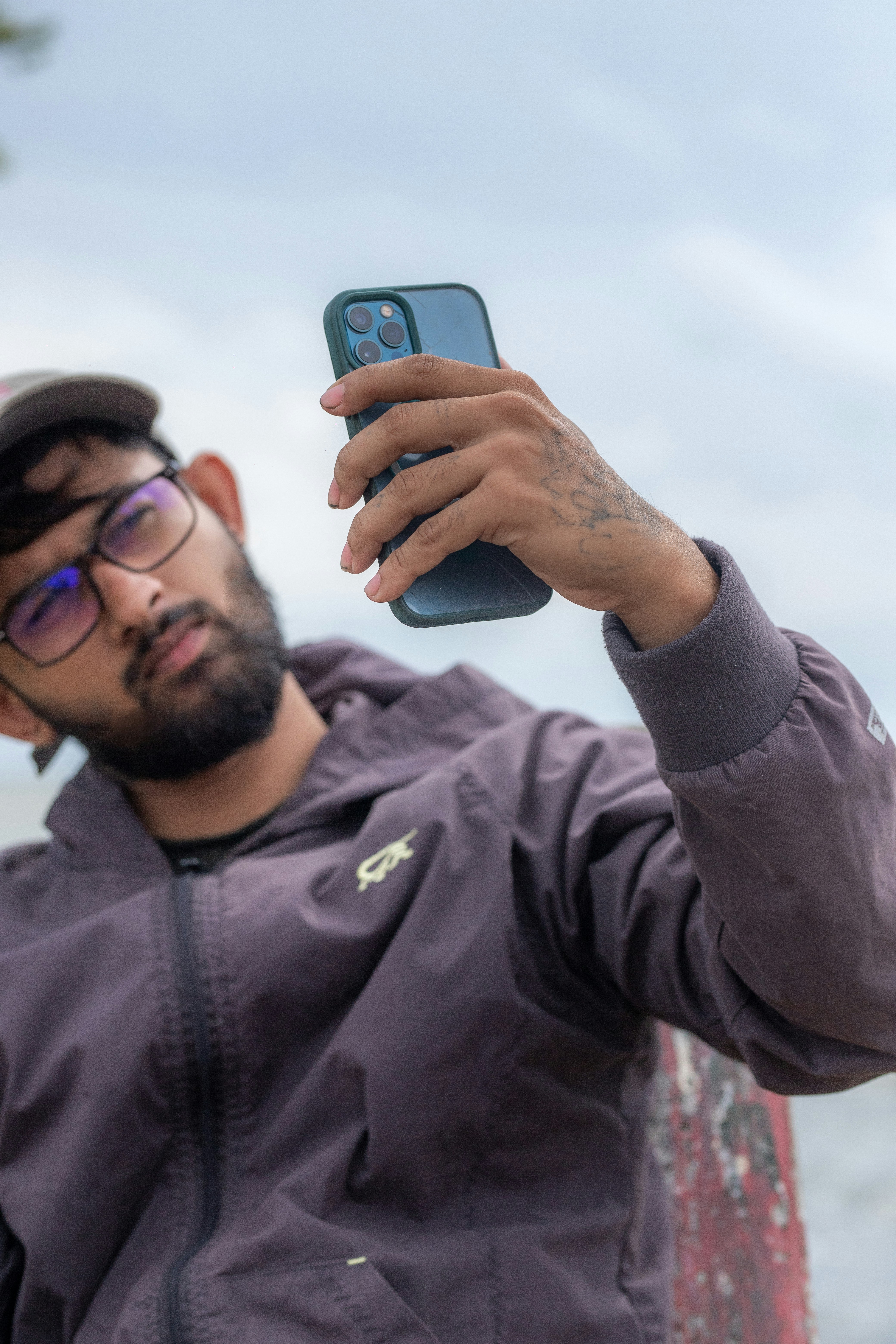 Selfie in Focus: A Handsome Moment Raised by the Ring of Glass