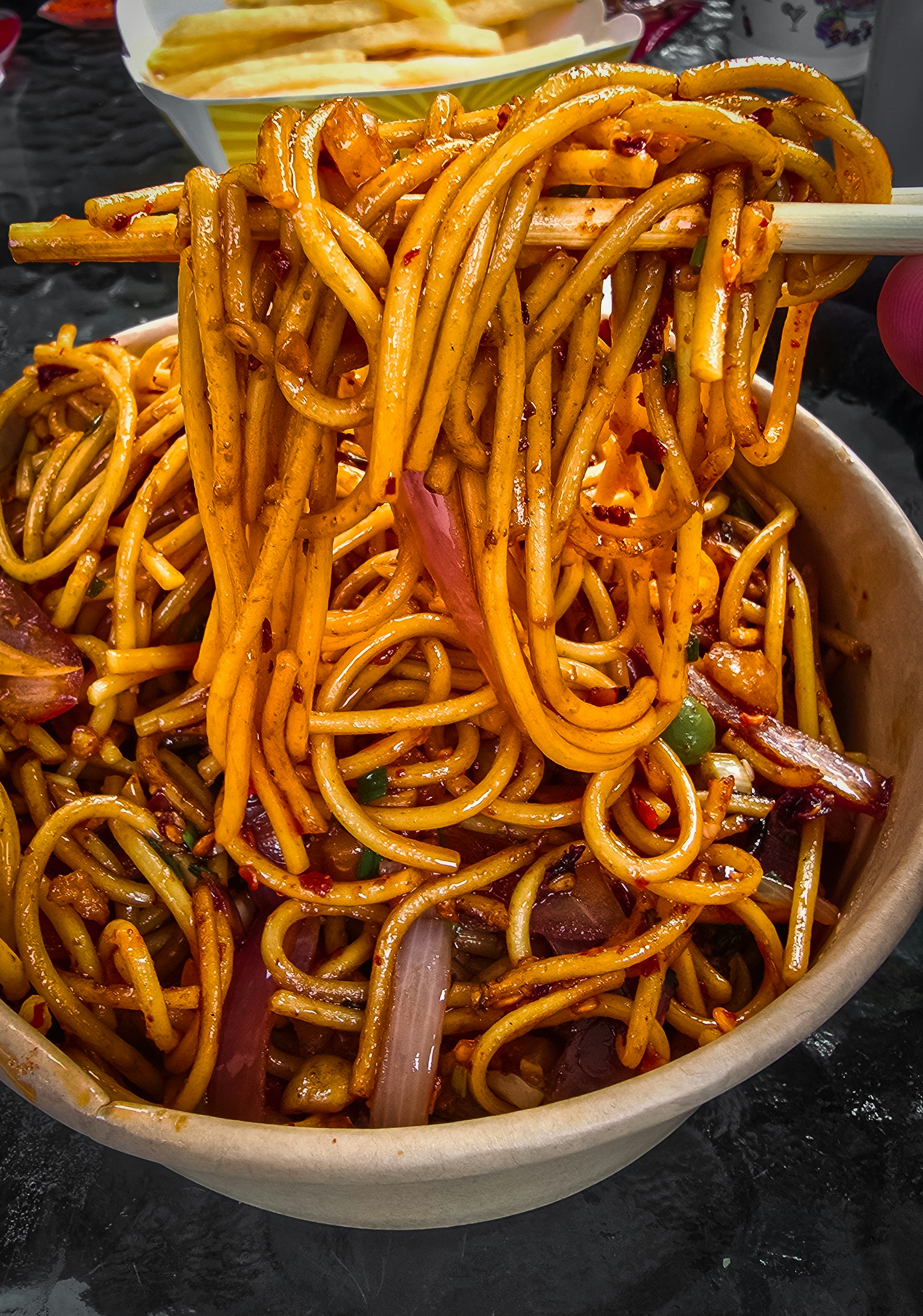 Twist of Umami: Chopsticks Lift a Louder Slurp of Noodles