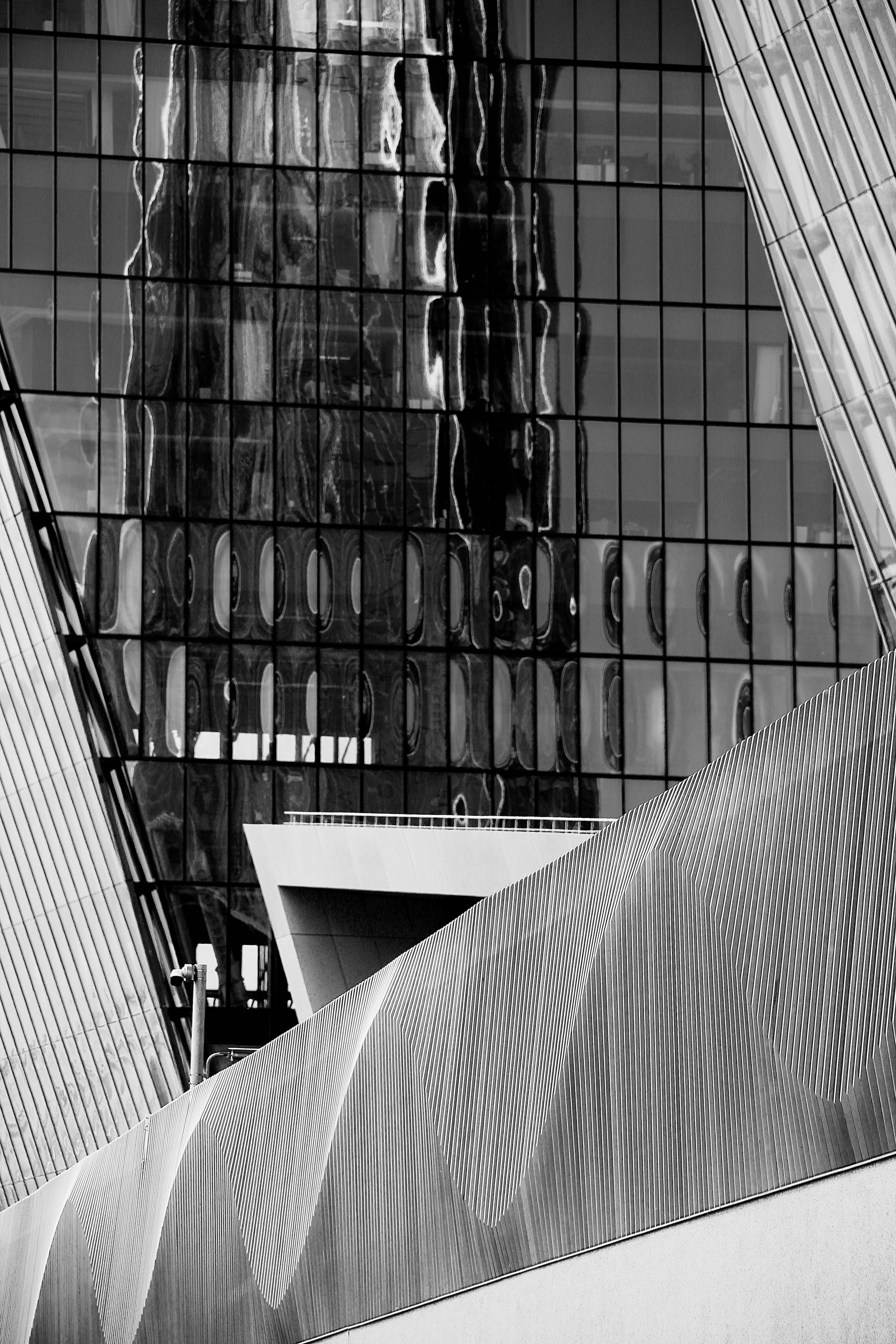 Converging Facades: Geometry and Glass in Motion