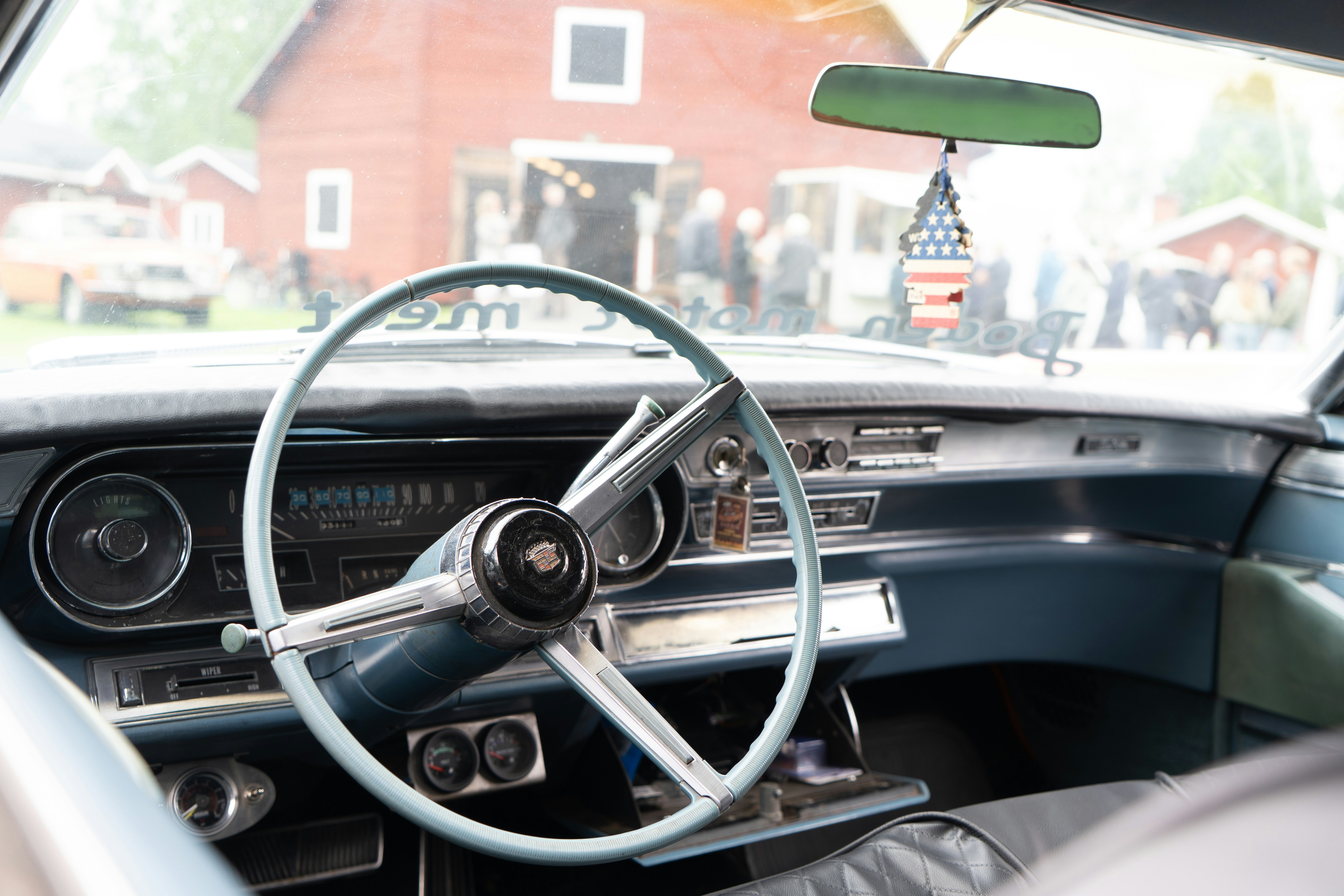 Classic Car's Quiet Intimacy: A View Through the Vintage Steward's Wheel