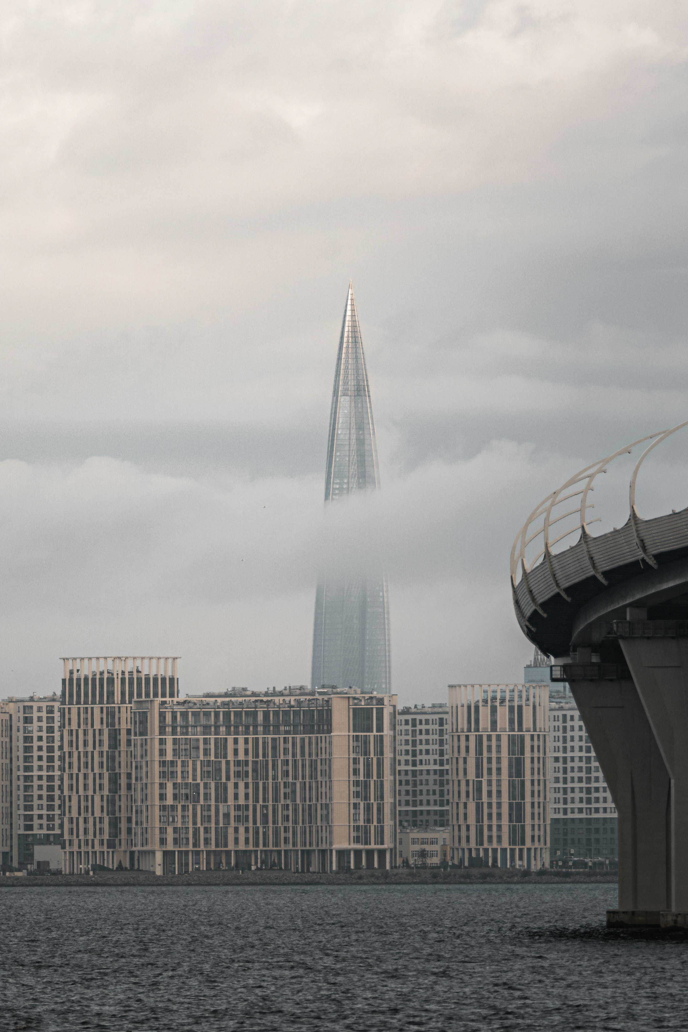 Shrouded Needle: The Shard Emerges Through the Mist over the Thames
