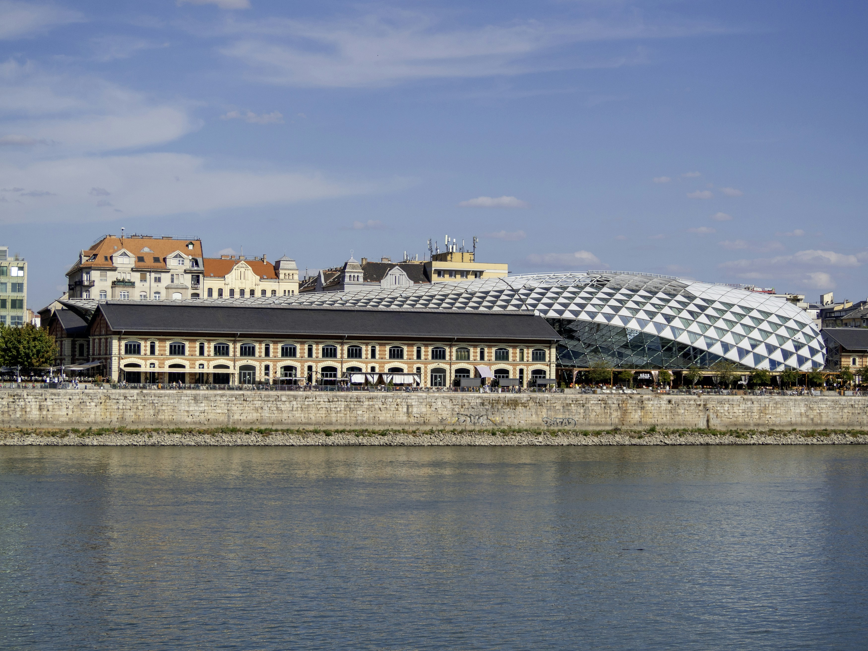 Riverside Confluence: Historic Dockside Meets Modern Glass