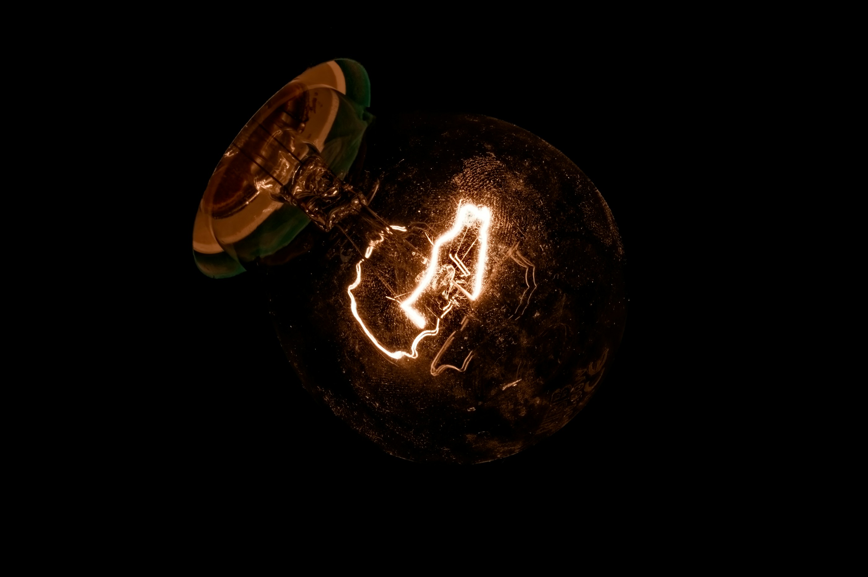 Ignition in the Void: a glowing filament within a shattered globe