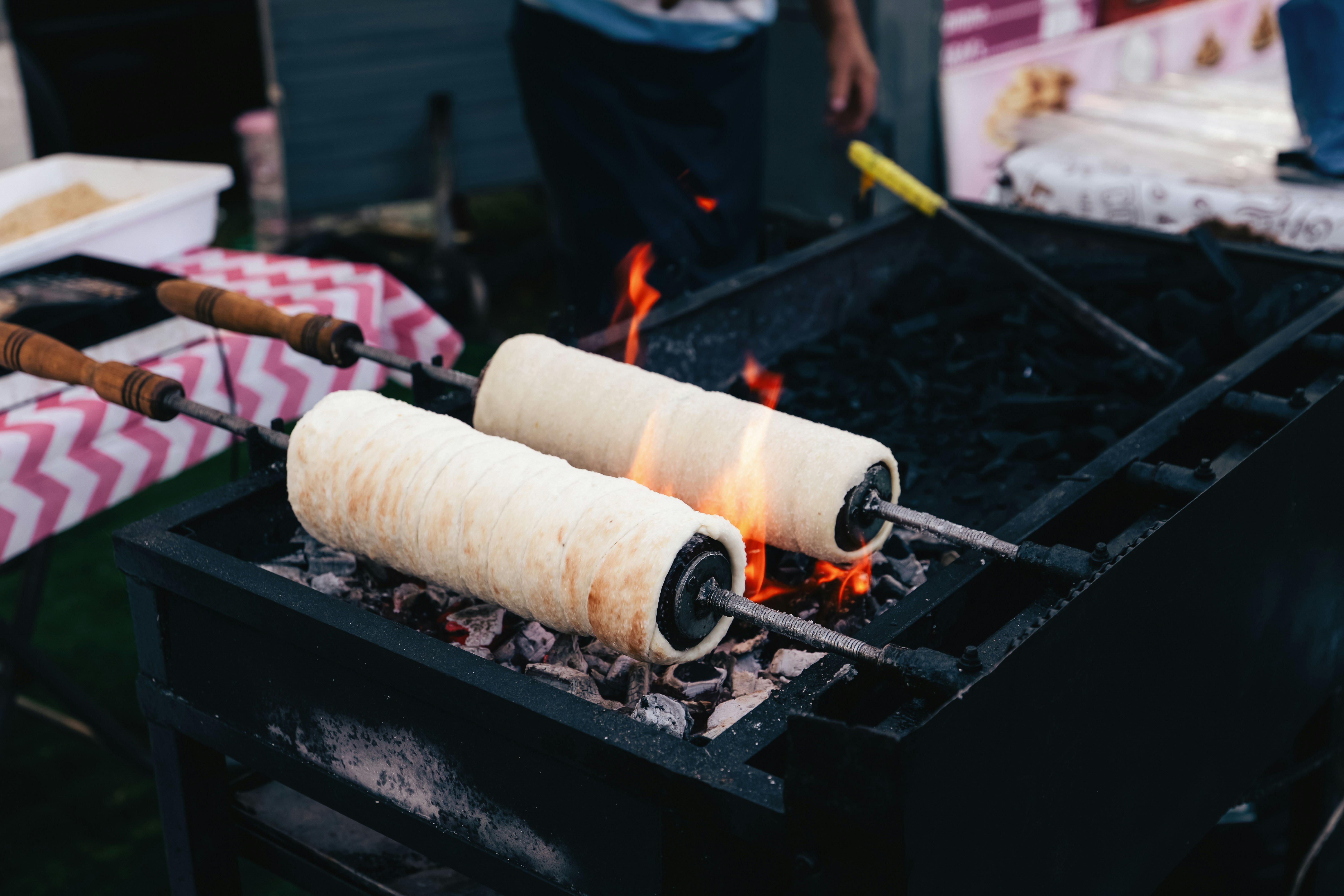 Grilled Rolling Delights: Fire-kissed Taquito Wraps on an Open Grill