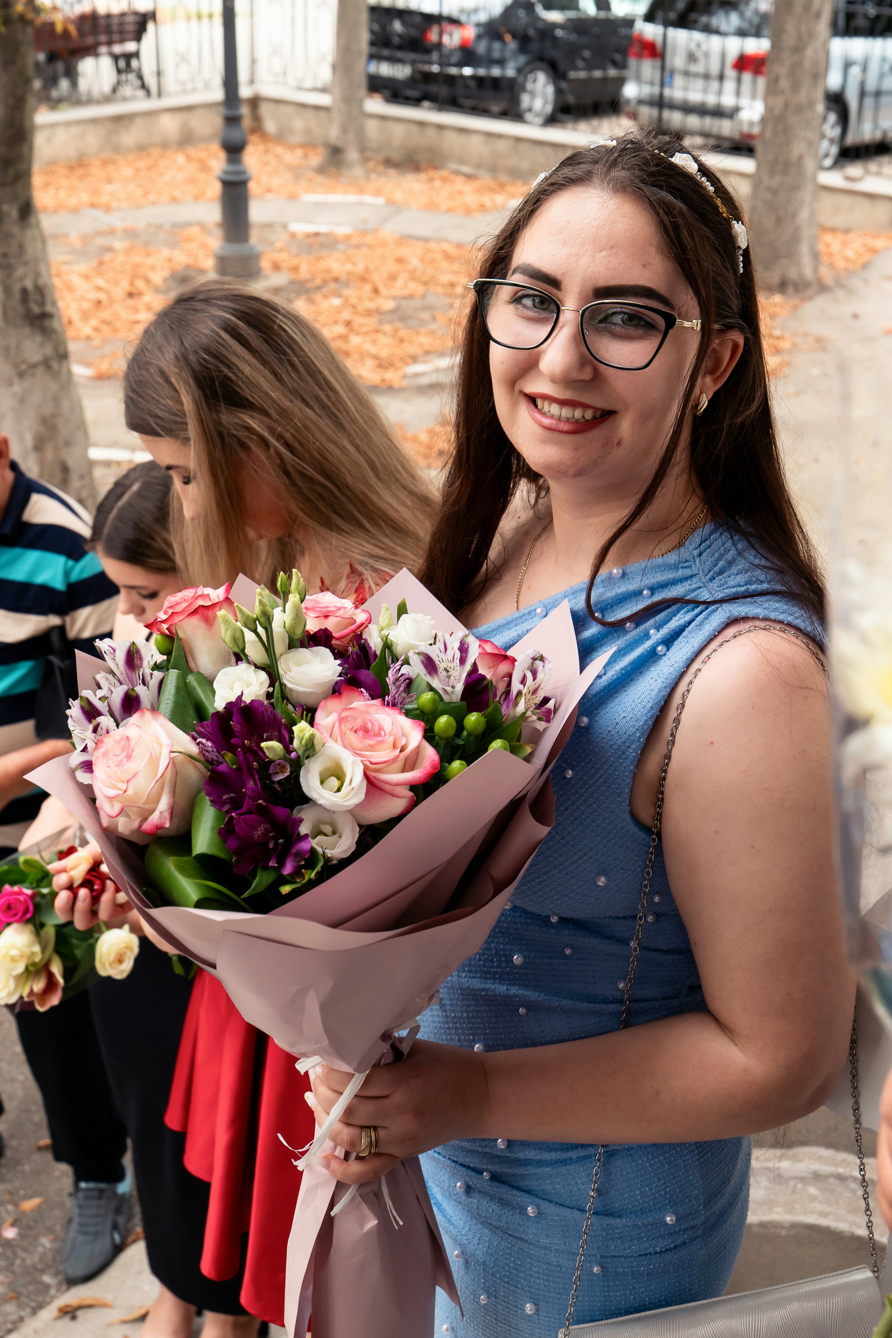 Bouquet and Smile: A Moment of Celebration
