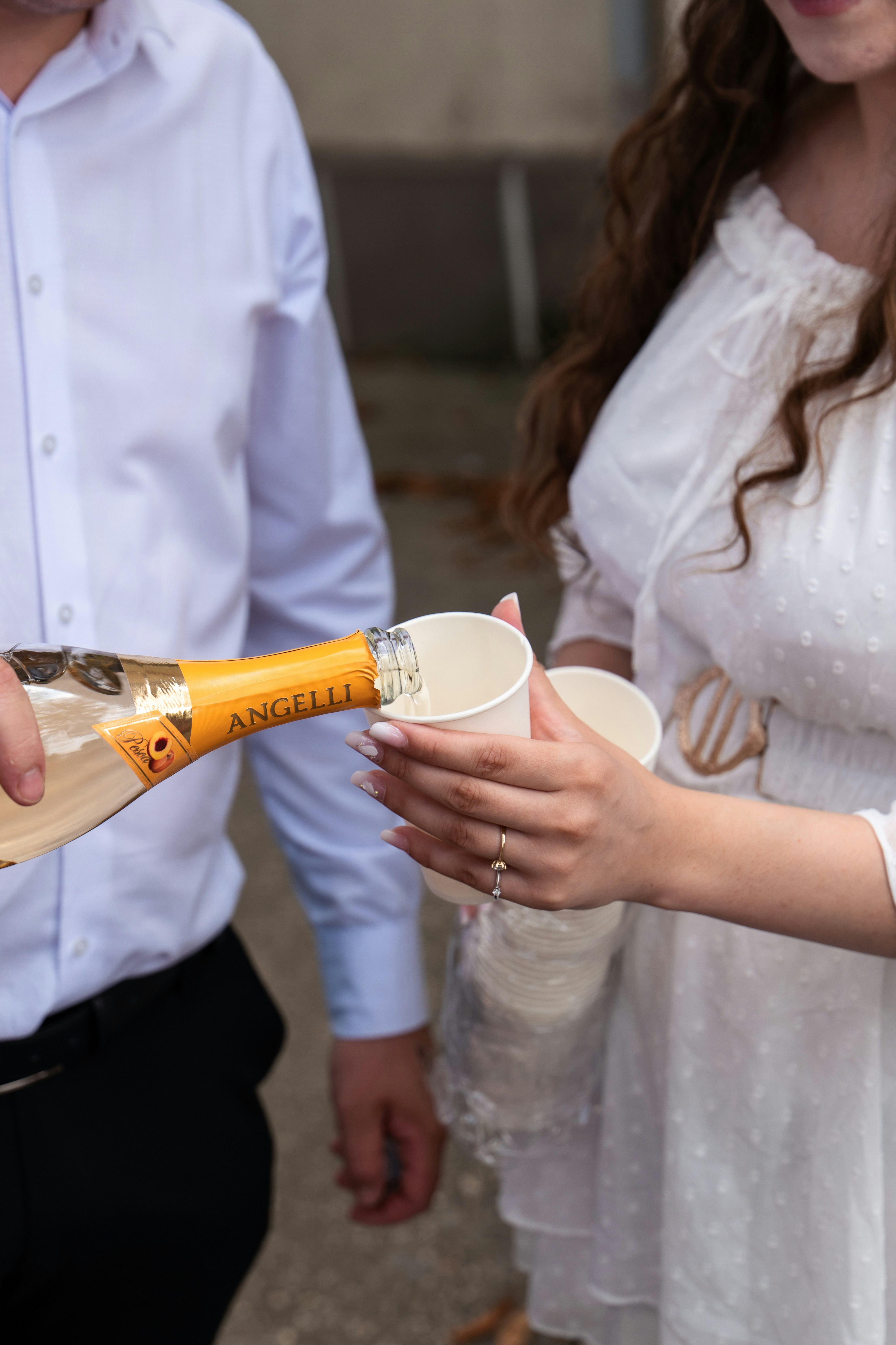 Toast of the Moment: Champagne Curtain Raises at the Couple's Celebration