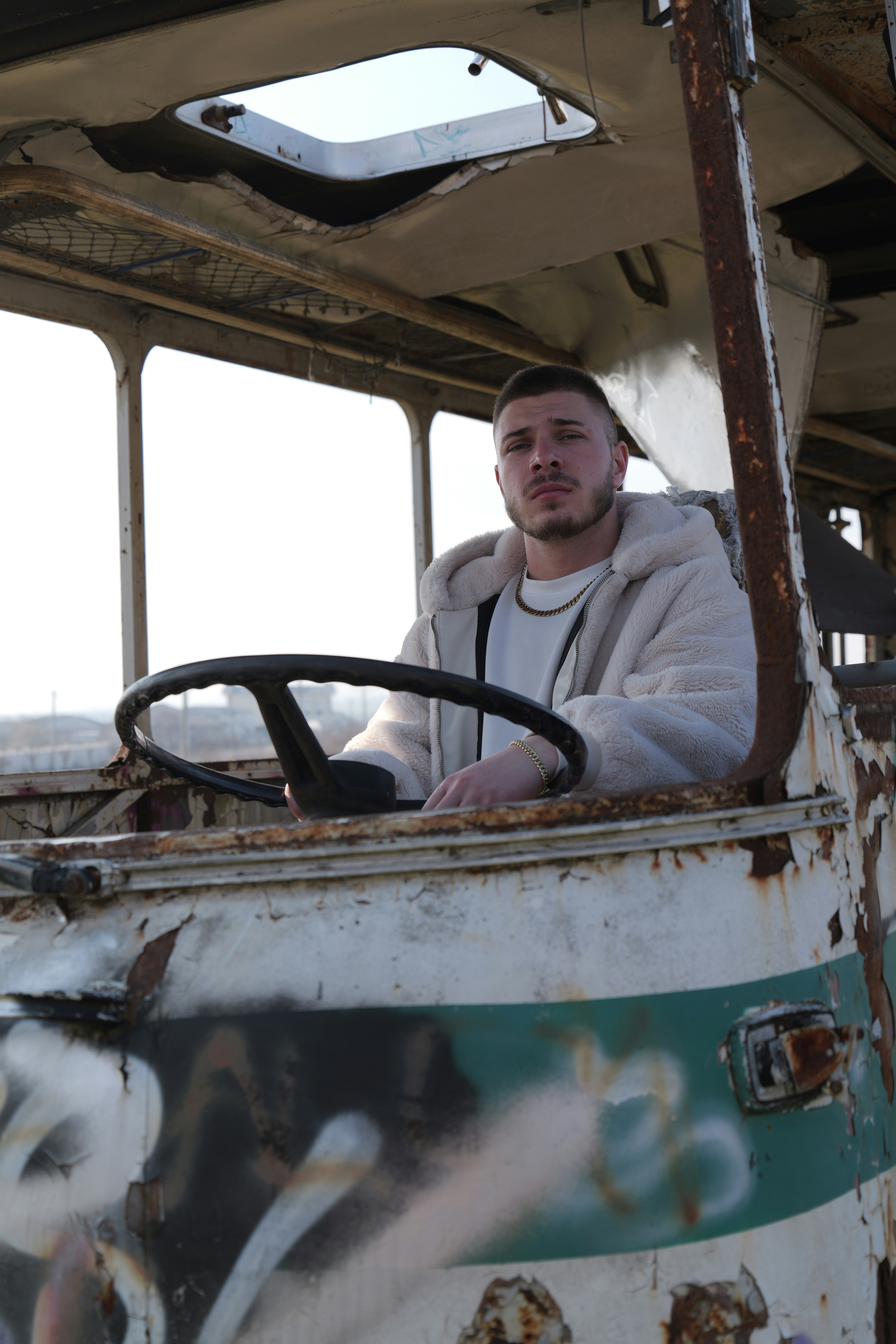 Steering Through Decay: A Seasoned Driver in a Rusted Vessel