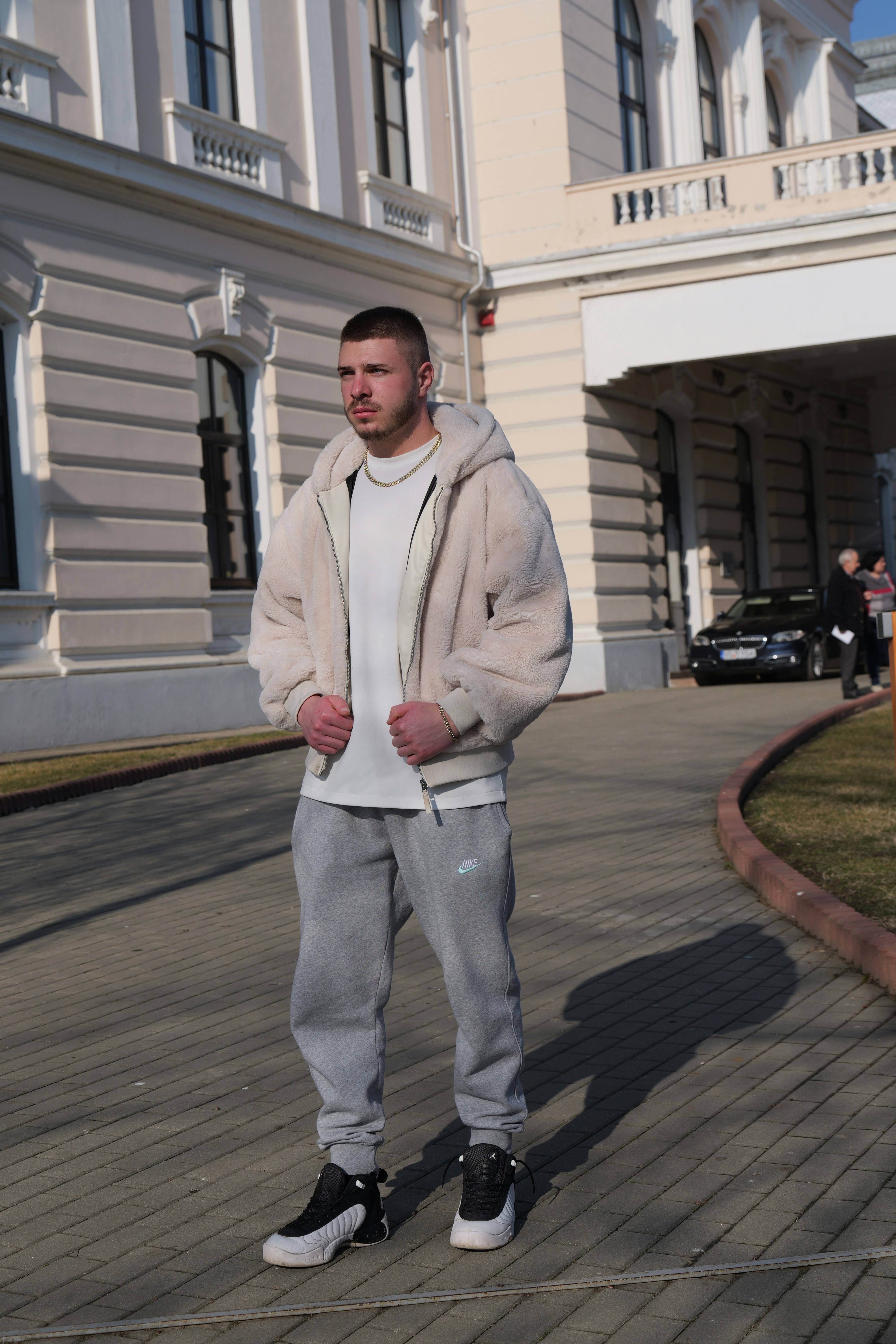 Casual Confidence: Street Portrait in Soft Hoodie and White Tee