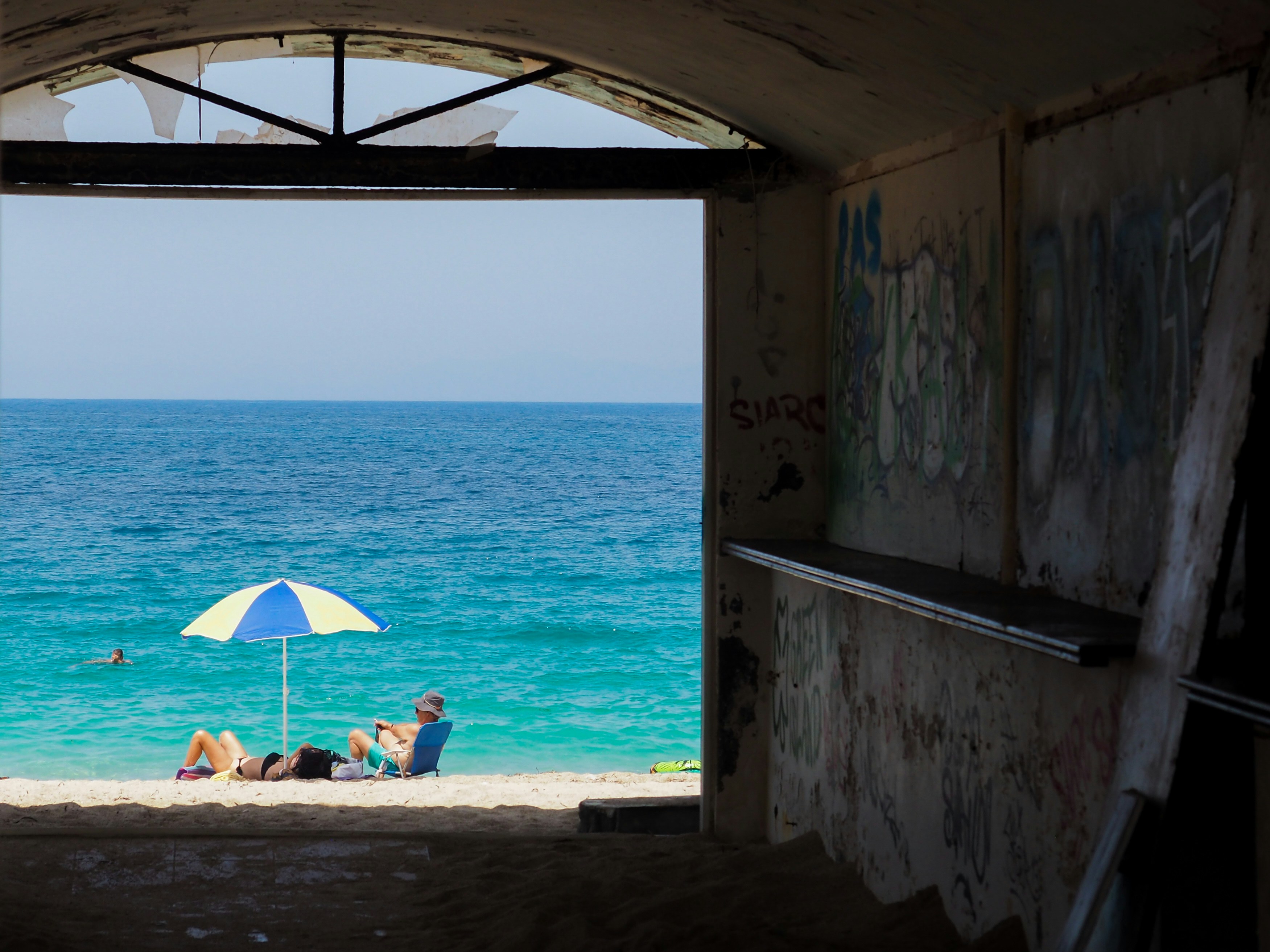 Sea View Through a Weathered Archway