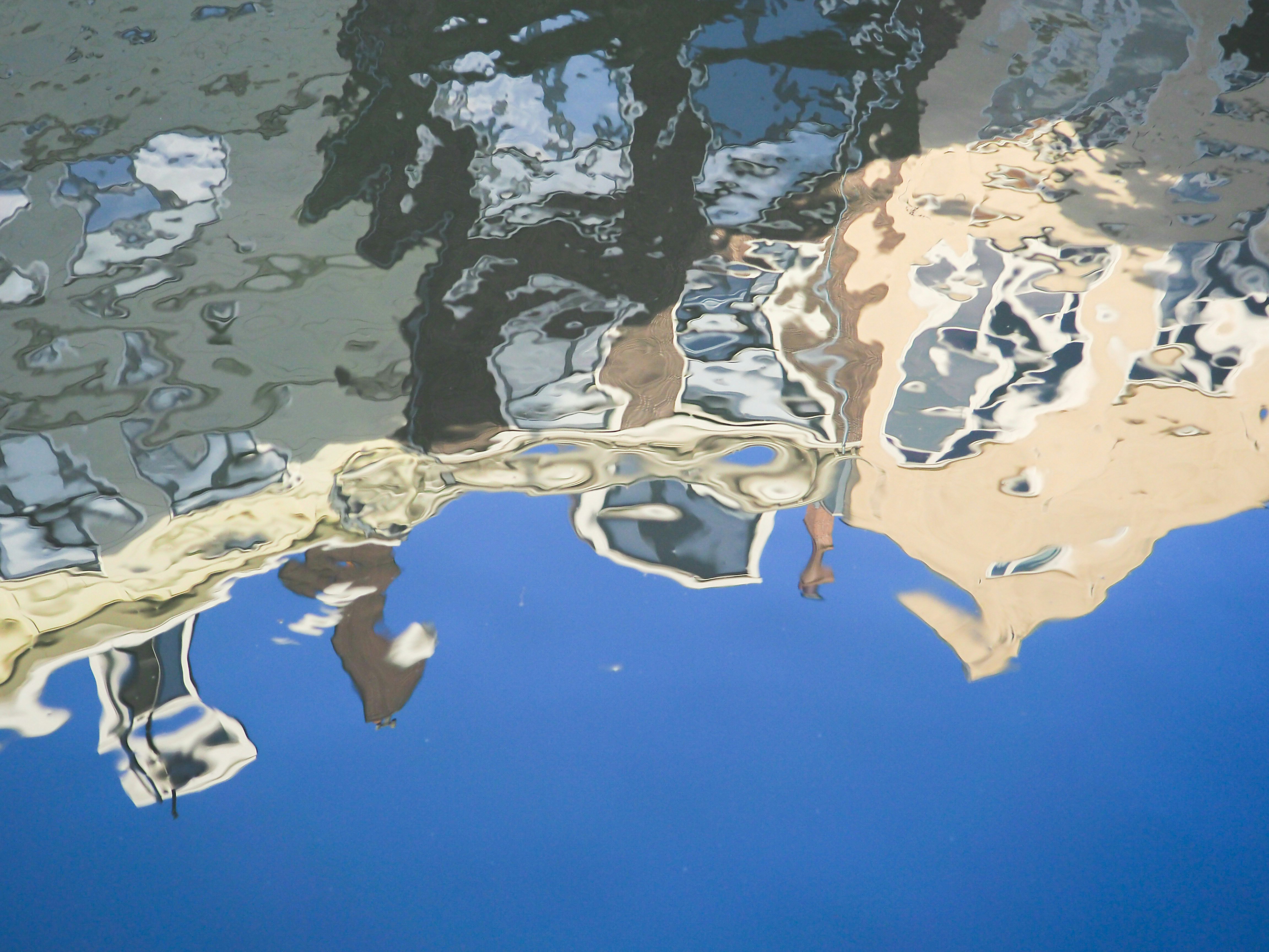 Azure Reflections of a Distant Facade