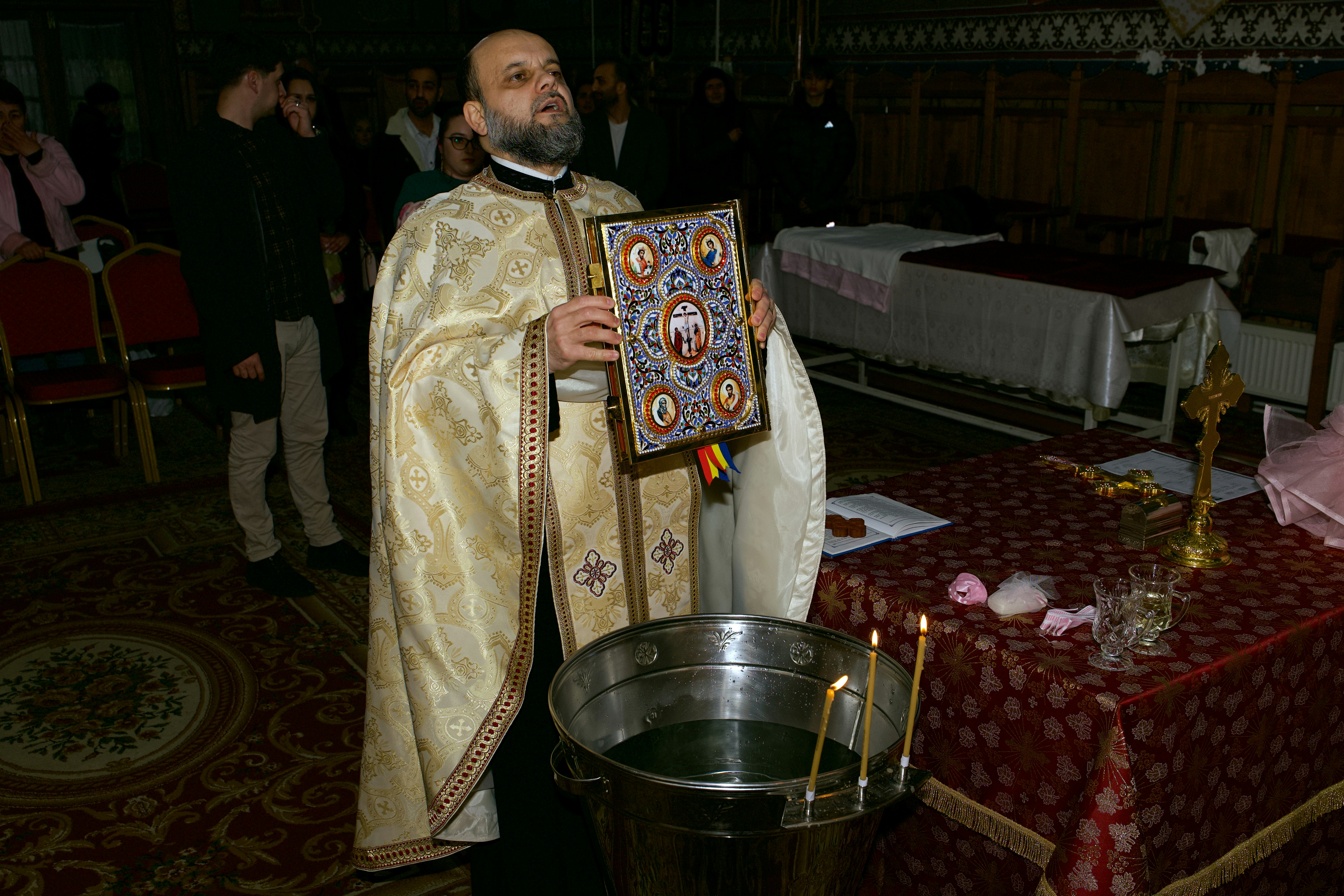 Blessing with a Sacred Icon: A Cleric at the Altar
