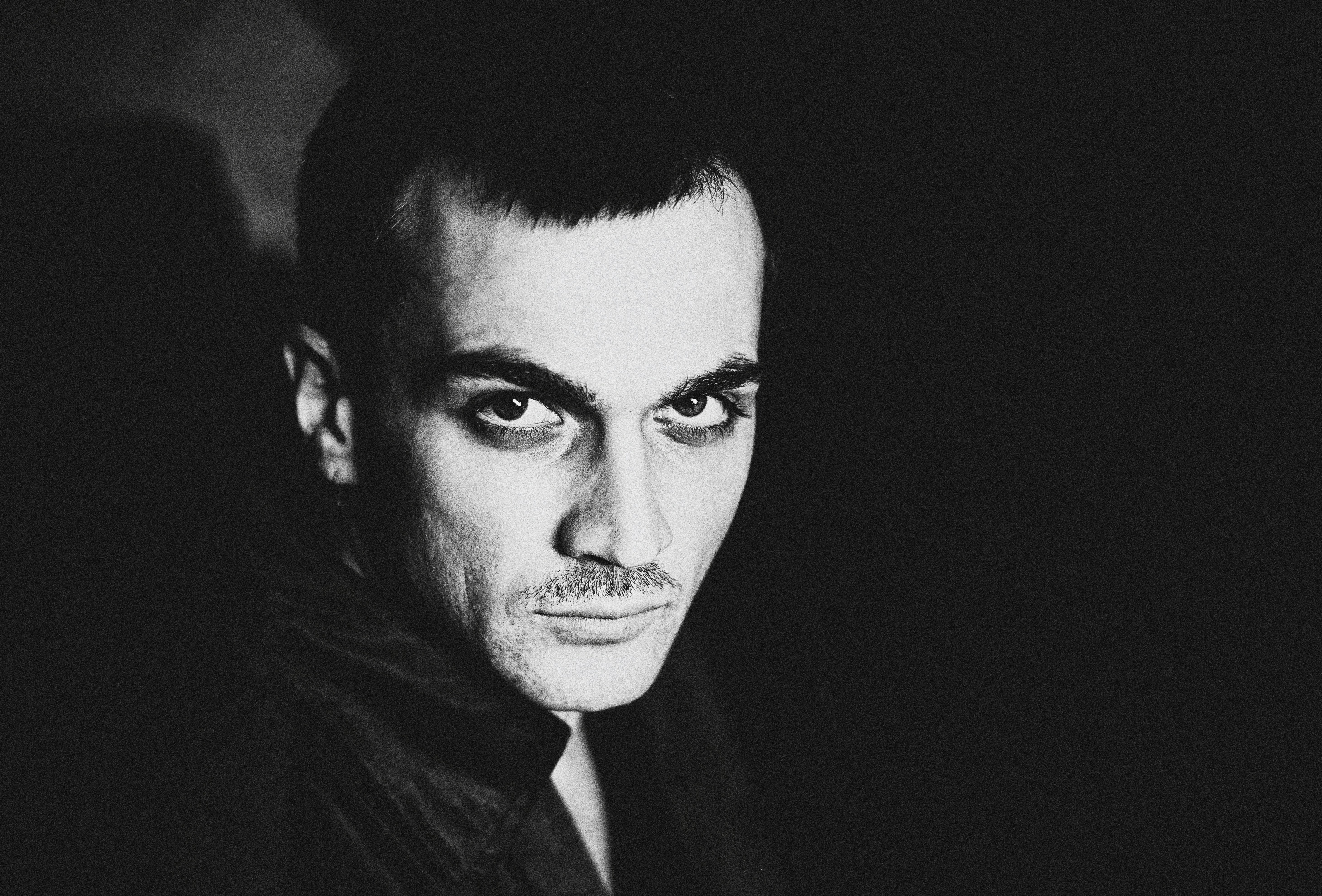 Midnight Gaze: A Studied Portrait in Mono